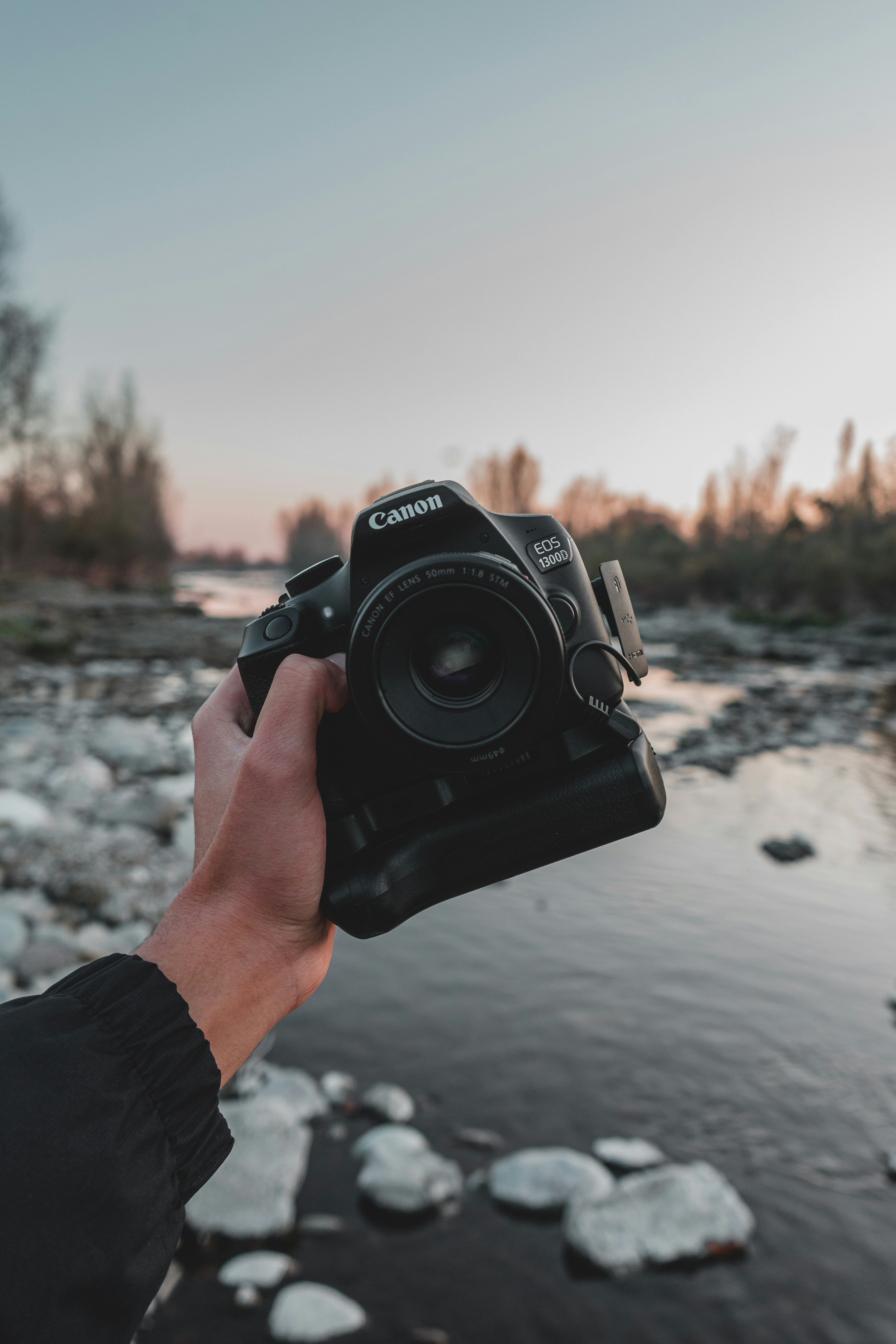 Person holding black nikon dslr camera photo – Free Camera Image on ...