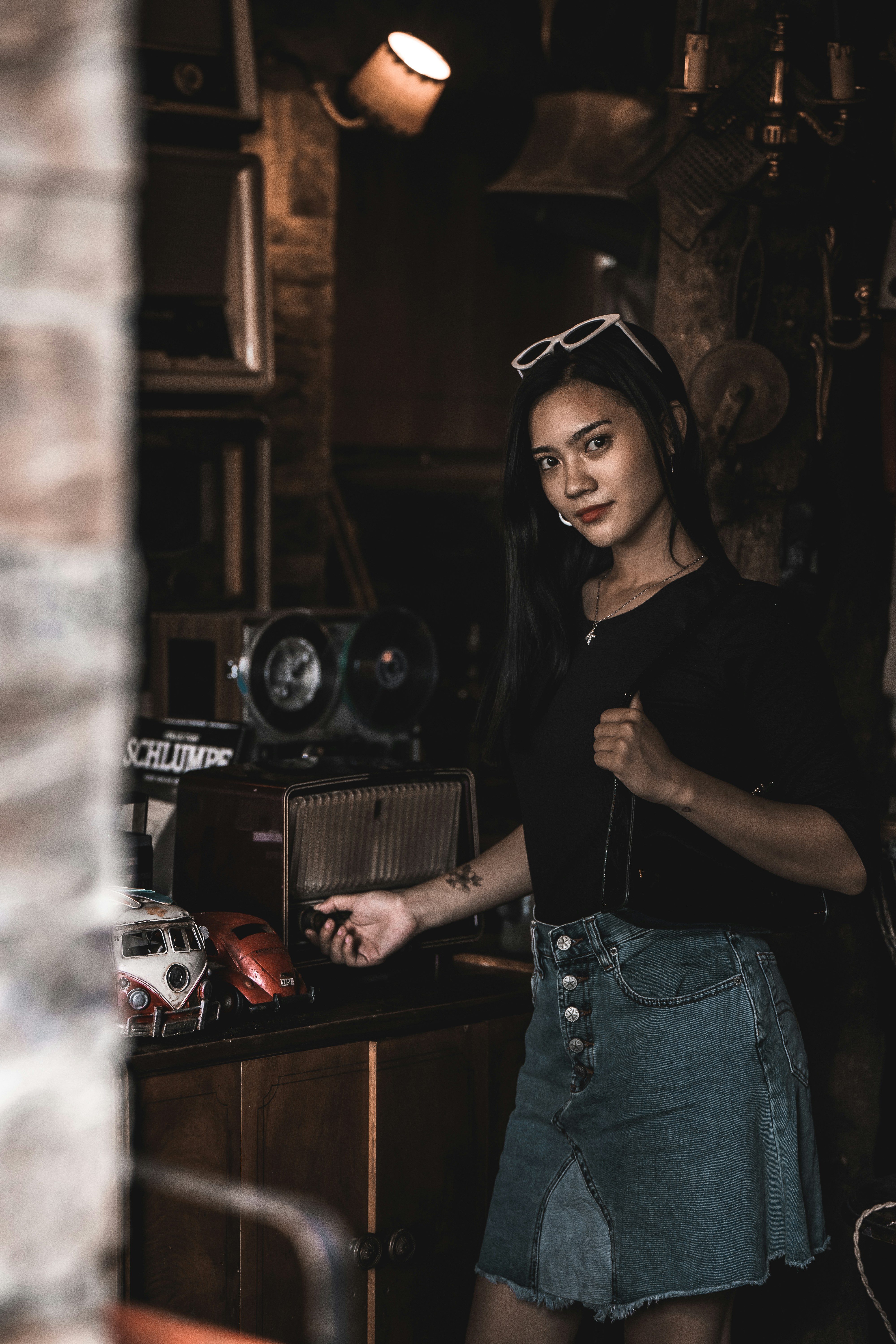 Shadowed Stillness: A Modern Muse in a Vintage Workshop