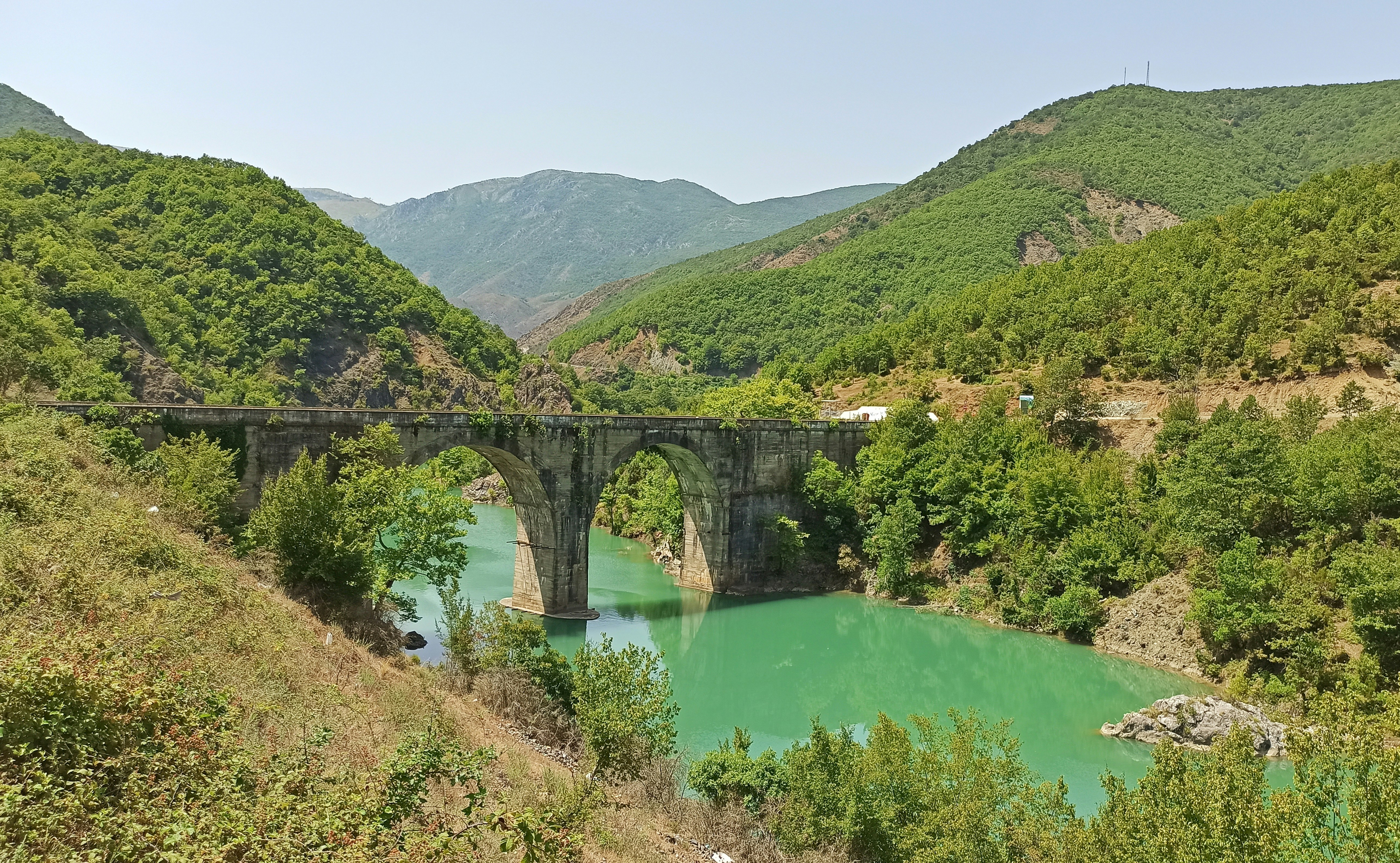 Gray concrete bridge over river during daytime photo – Free Ulza lake ...