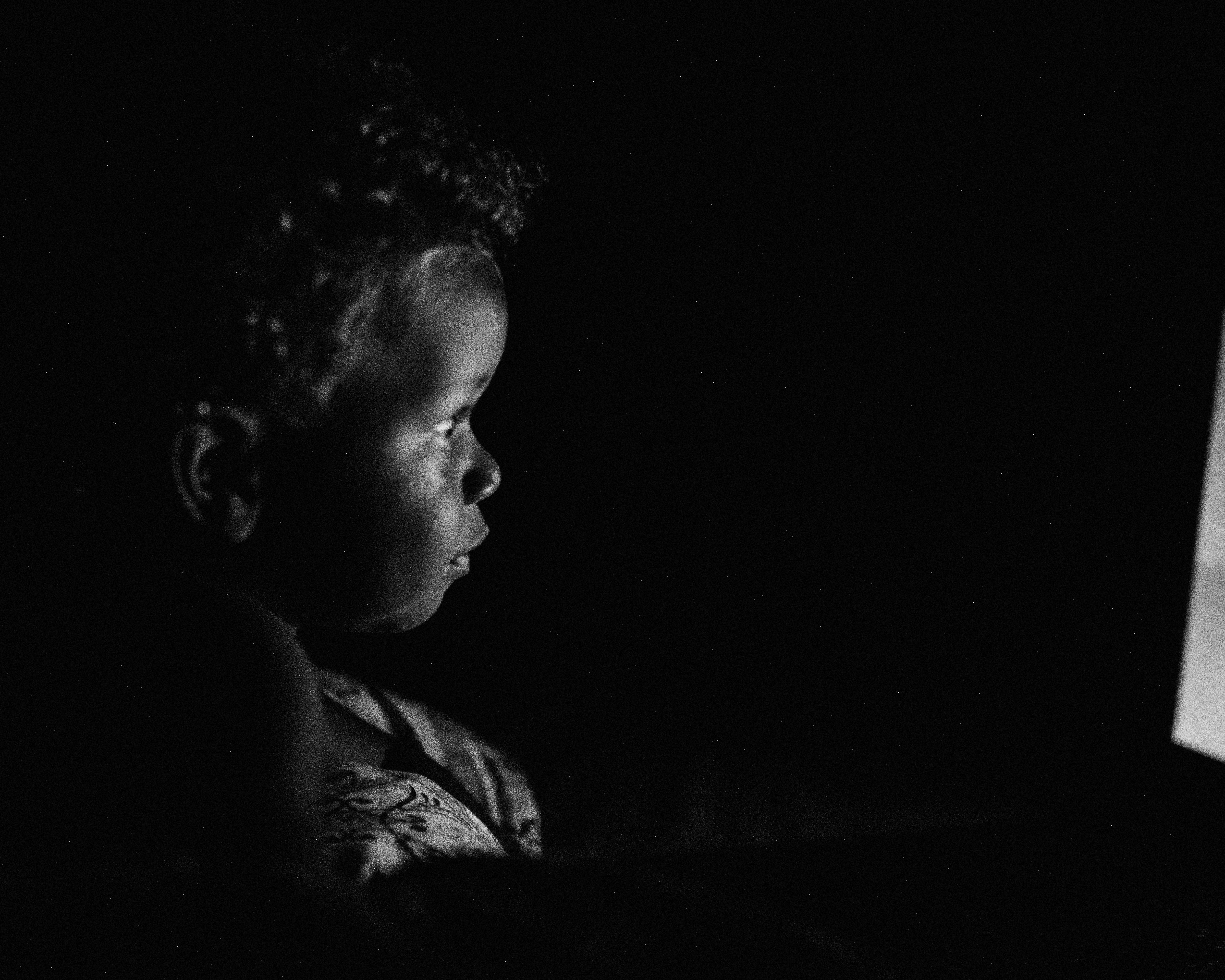 Grayscale photo of child looking at the right side photo – Free ...