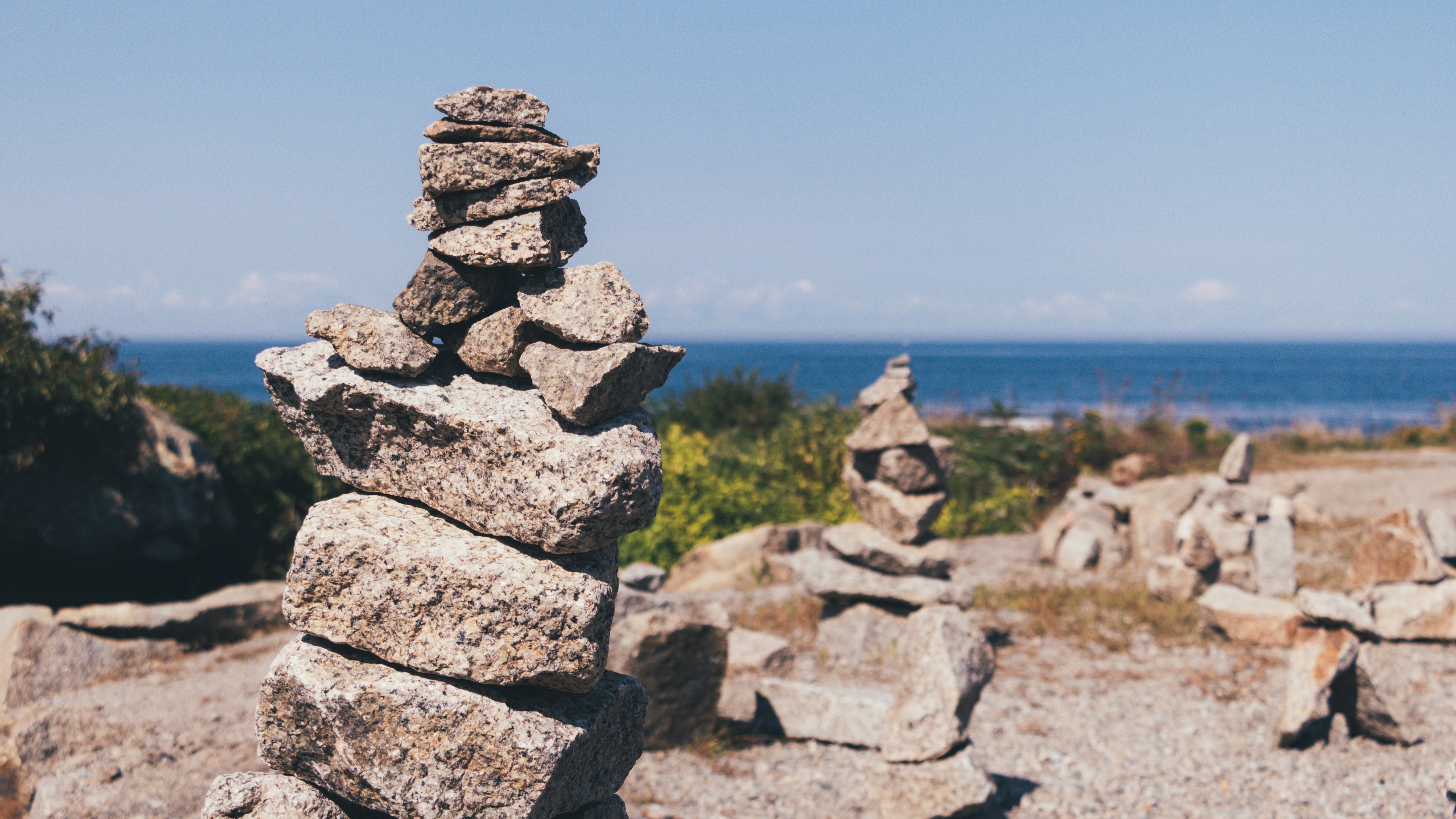 Stack of gray rocks near body of water during daytime photo – Free Rock ...