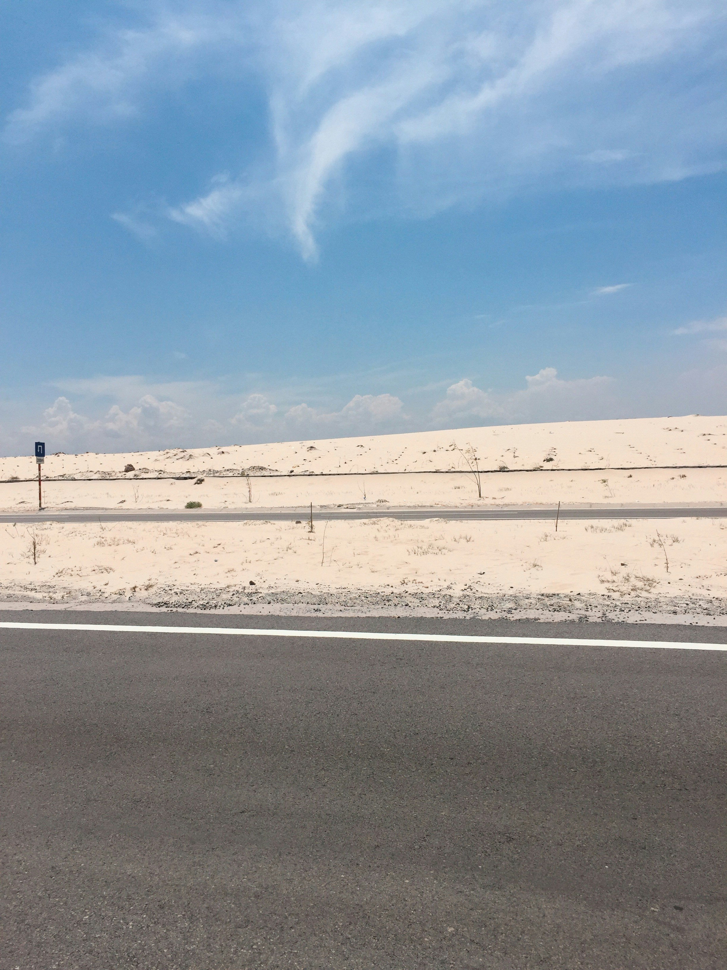 Desert Highway Horizon under a Wide Sky