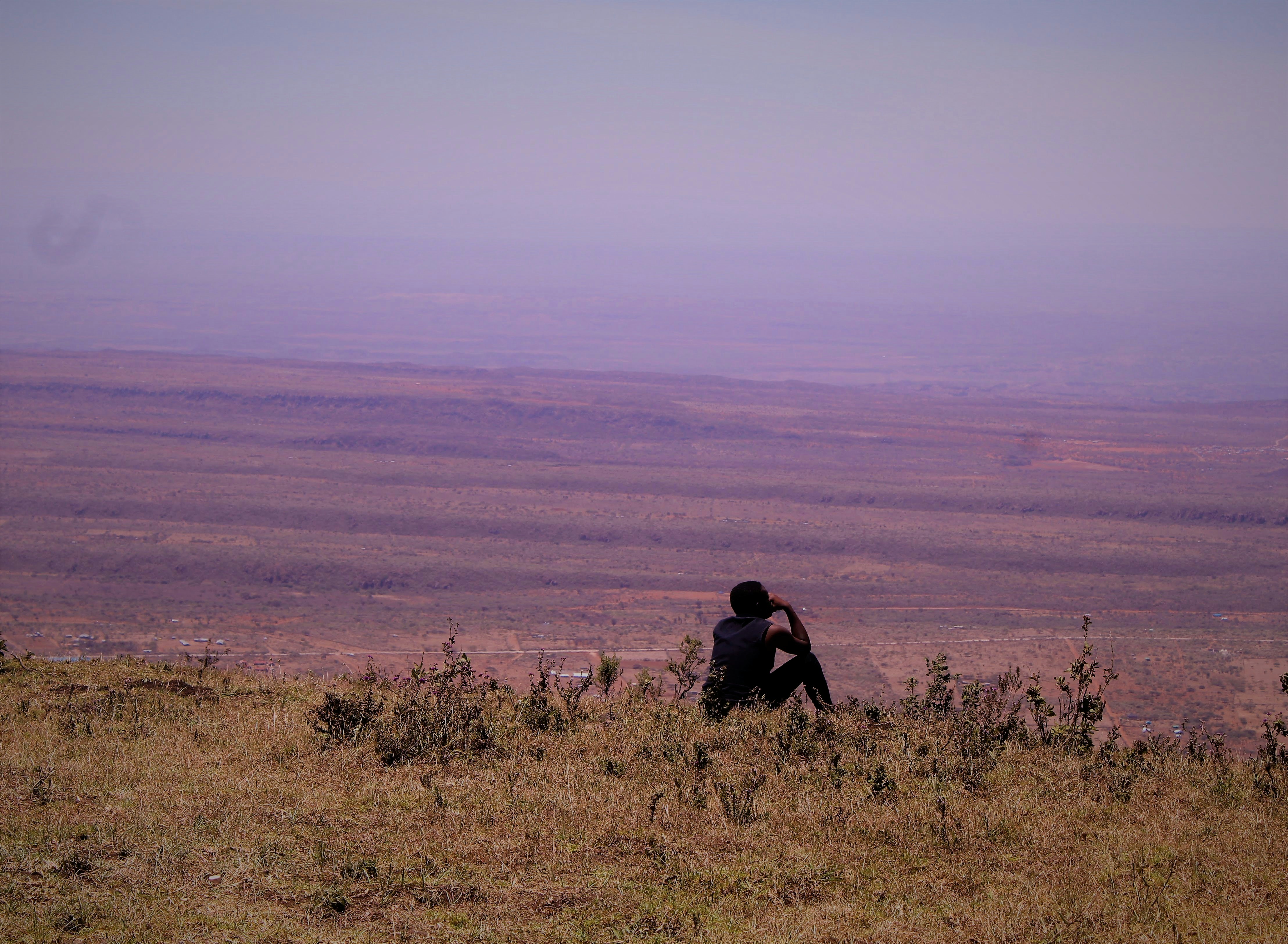 Horizon Gaze: A Lone Photographer in the Prairie Quiet