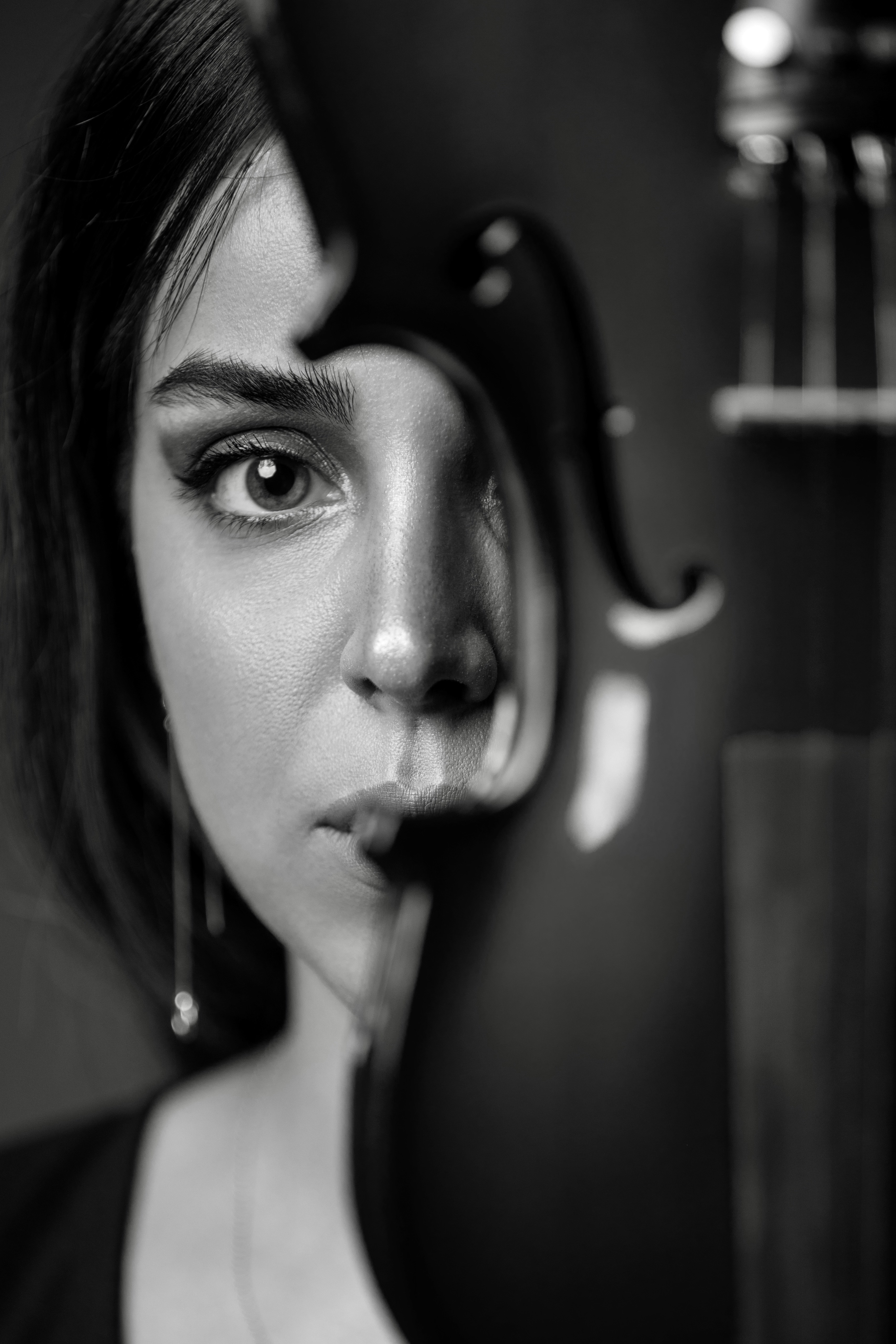 Gaze Through the F-Hole: A Portrait Framed by a Violin