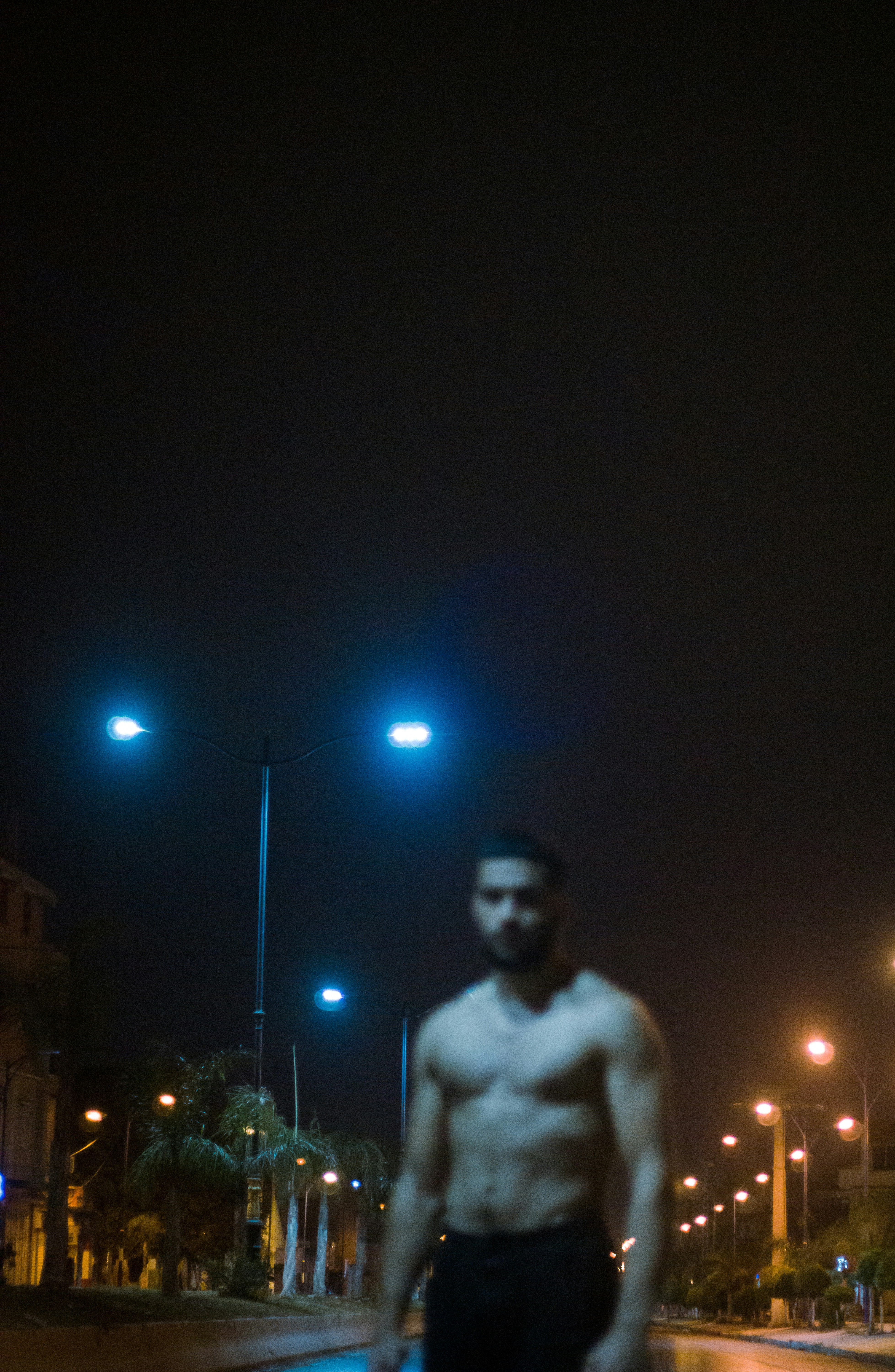 Midnight Drift Beneath Neon Streetlamps