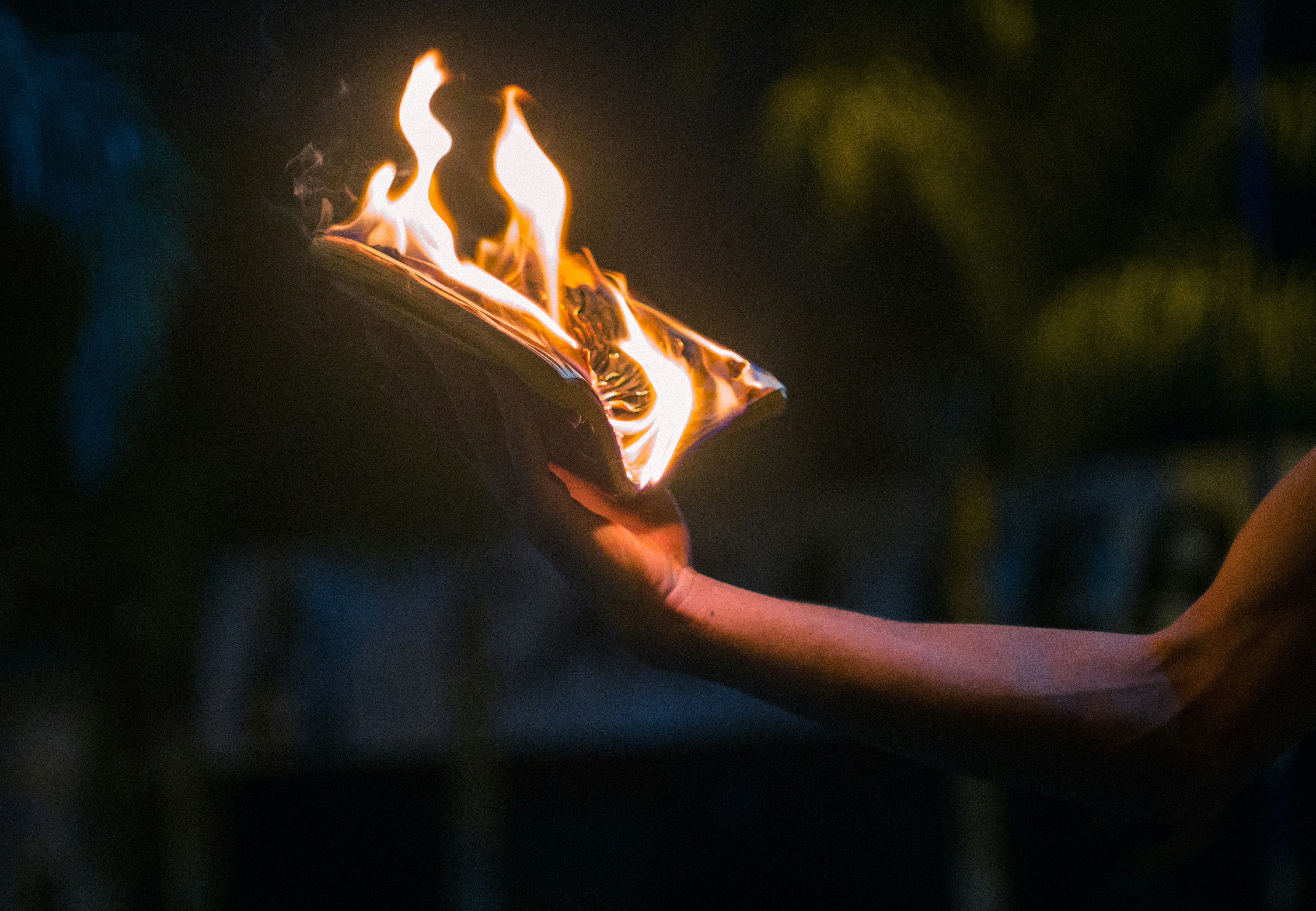 Person holding fire during night time photo – Free Human Image on Unsplash