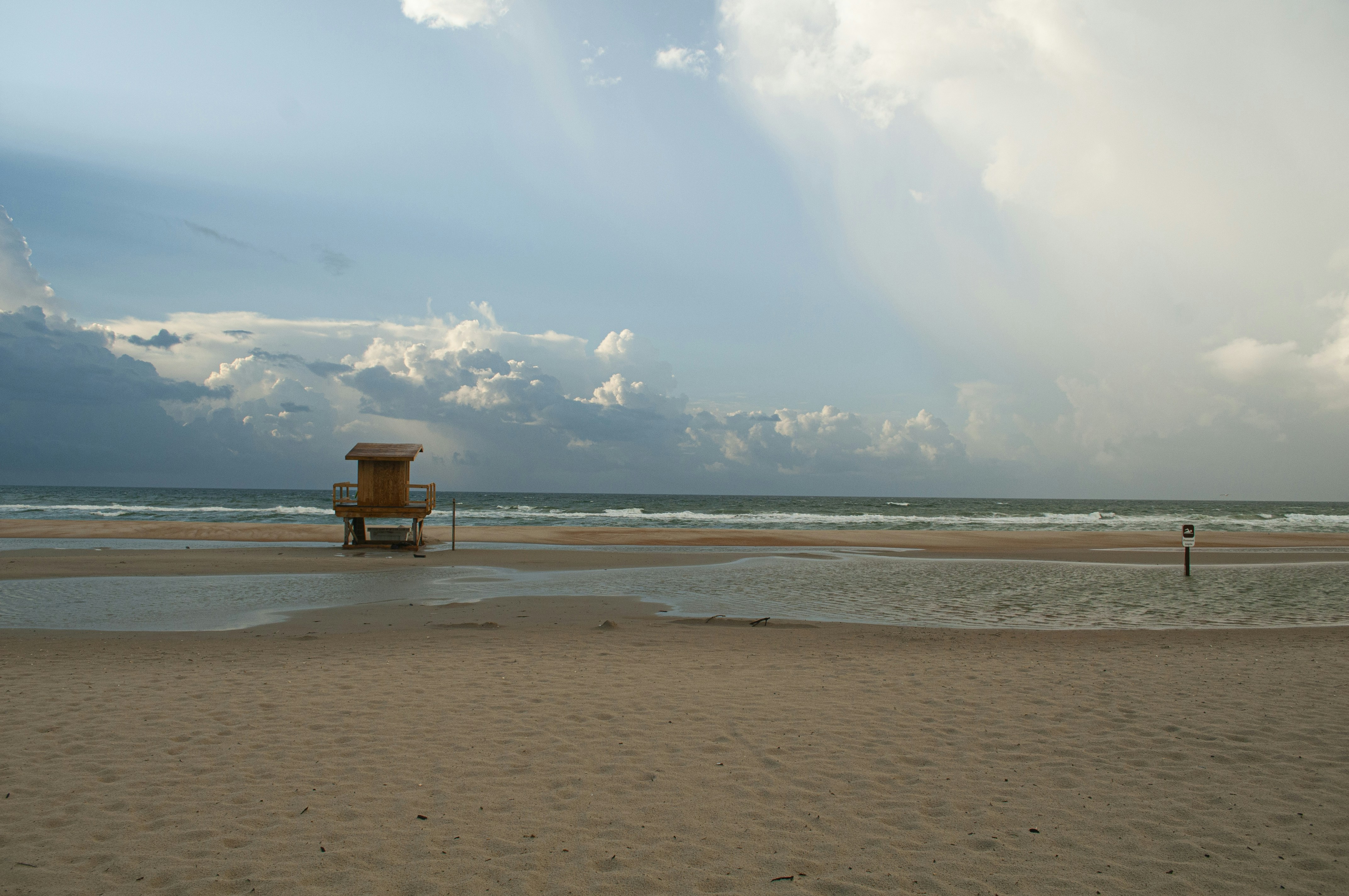Brown wooden lifeguard house on beach shore during daytime photo – Free ...
