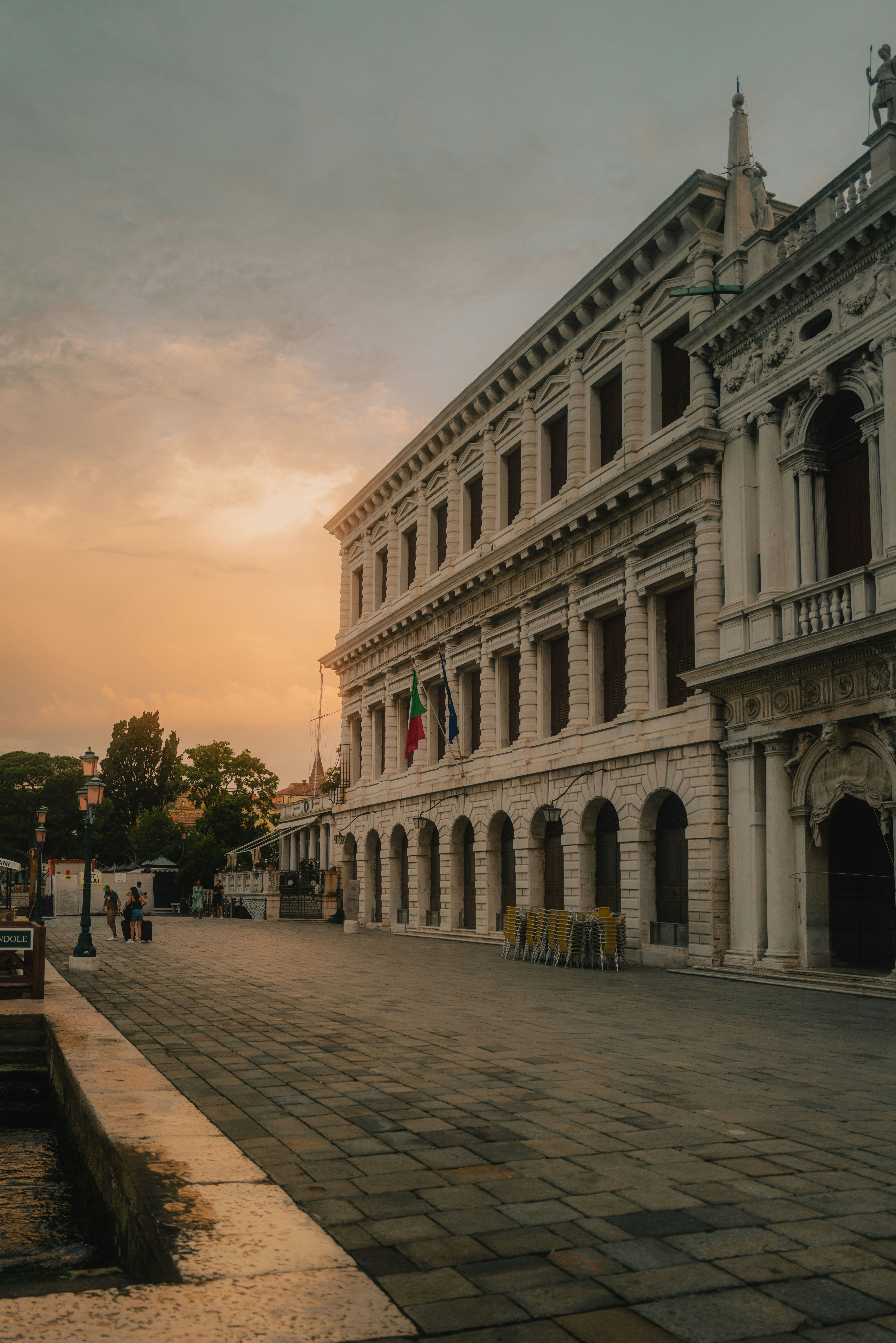 Golden Hour Along the Arched Italianate Facade