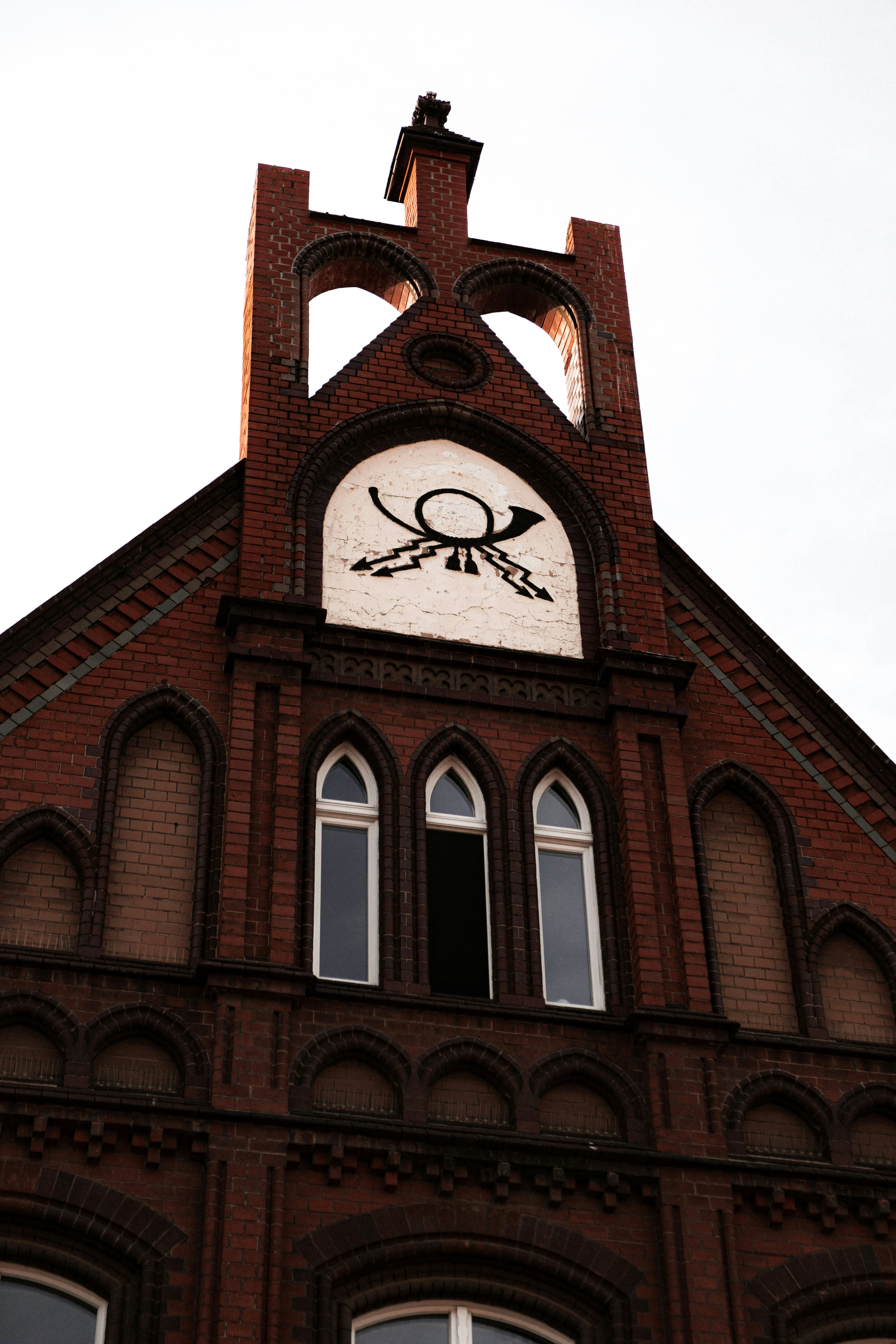 Brick Gothic Facade with Crestful Window