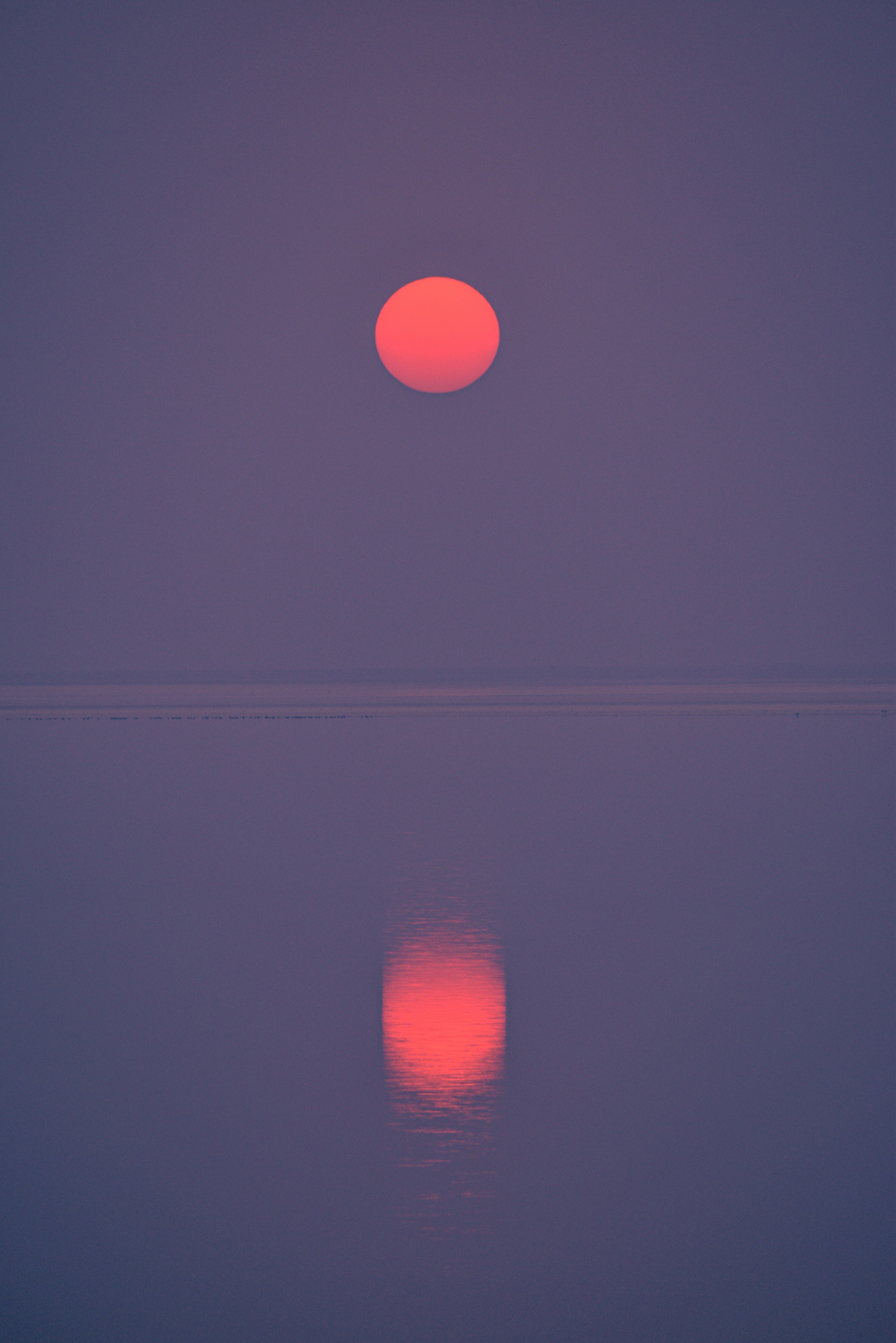 Crimson Sun on Velvet Waters