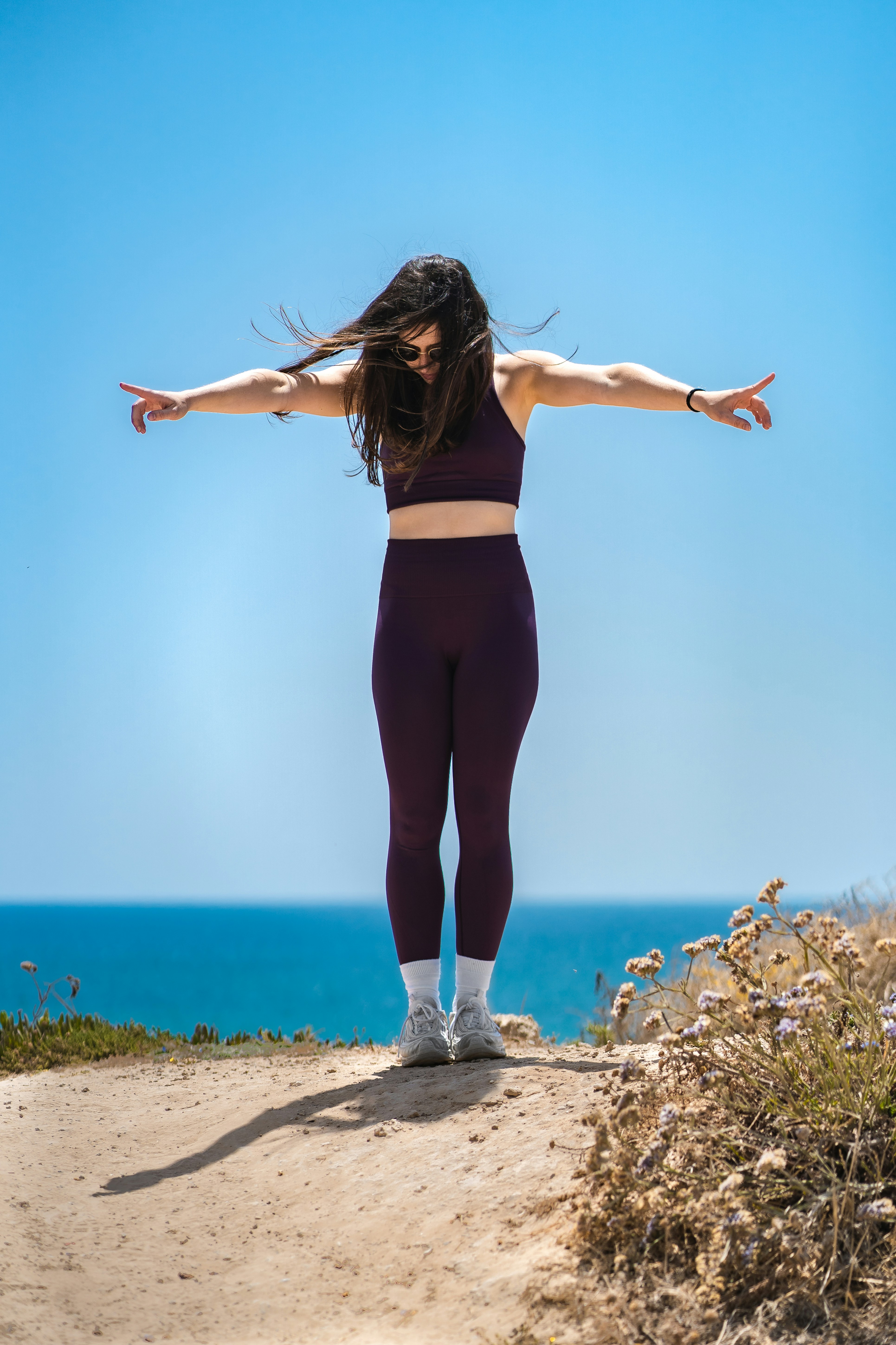 Horizon Span: A Bold Dune Pose Against the Sea