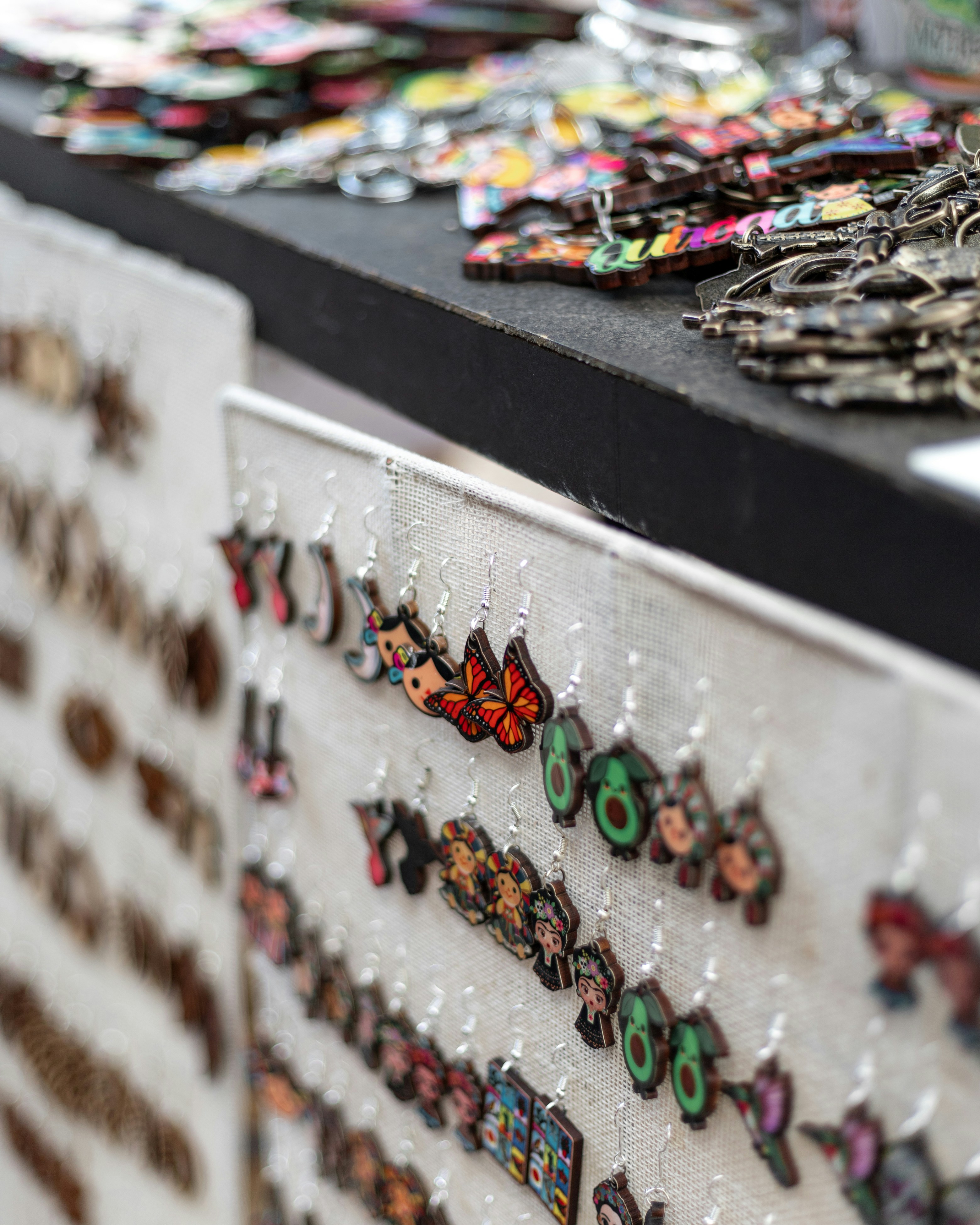 Butterflies and Charms: A Jewelry Stand in Soft Focus