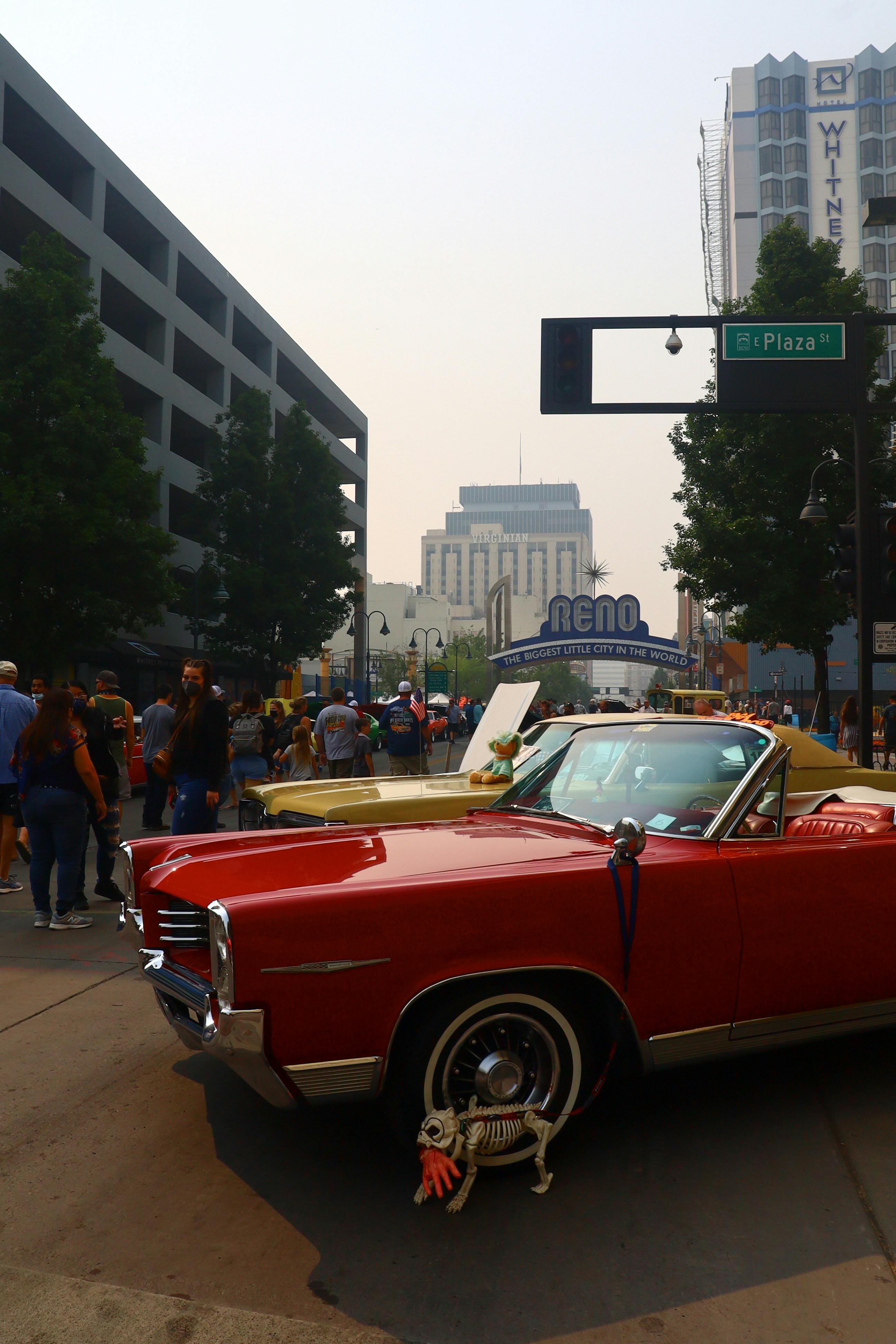 Crimson 1960s Convertible Leads Reno Street Parade