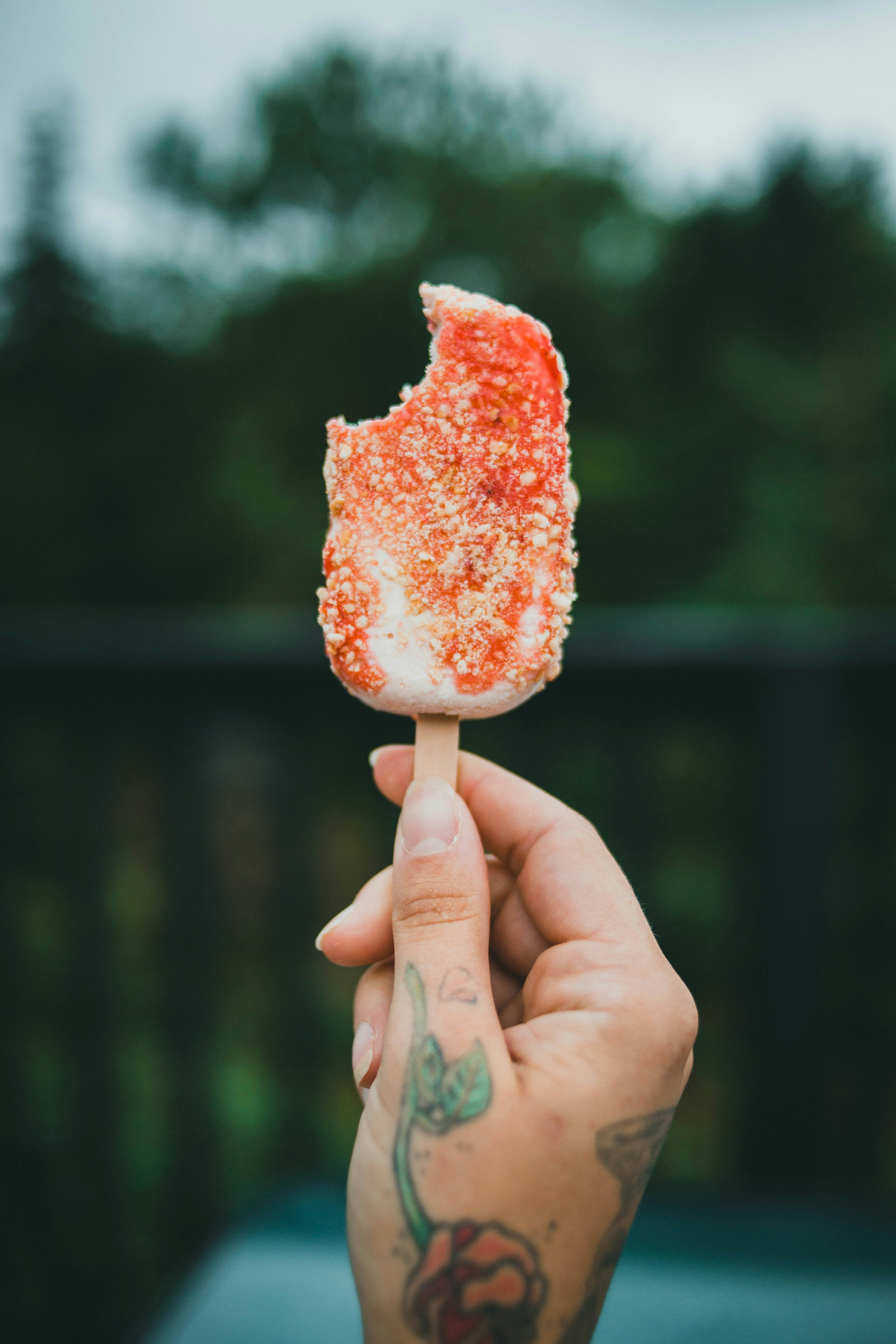 Person holding red ice pop photo – Free Food Image on Unsplash