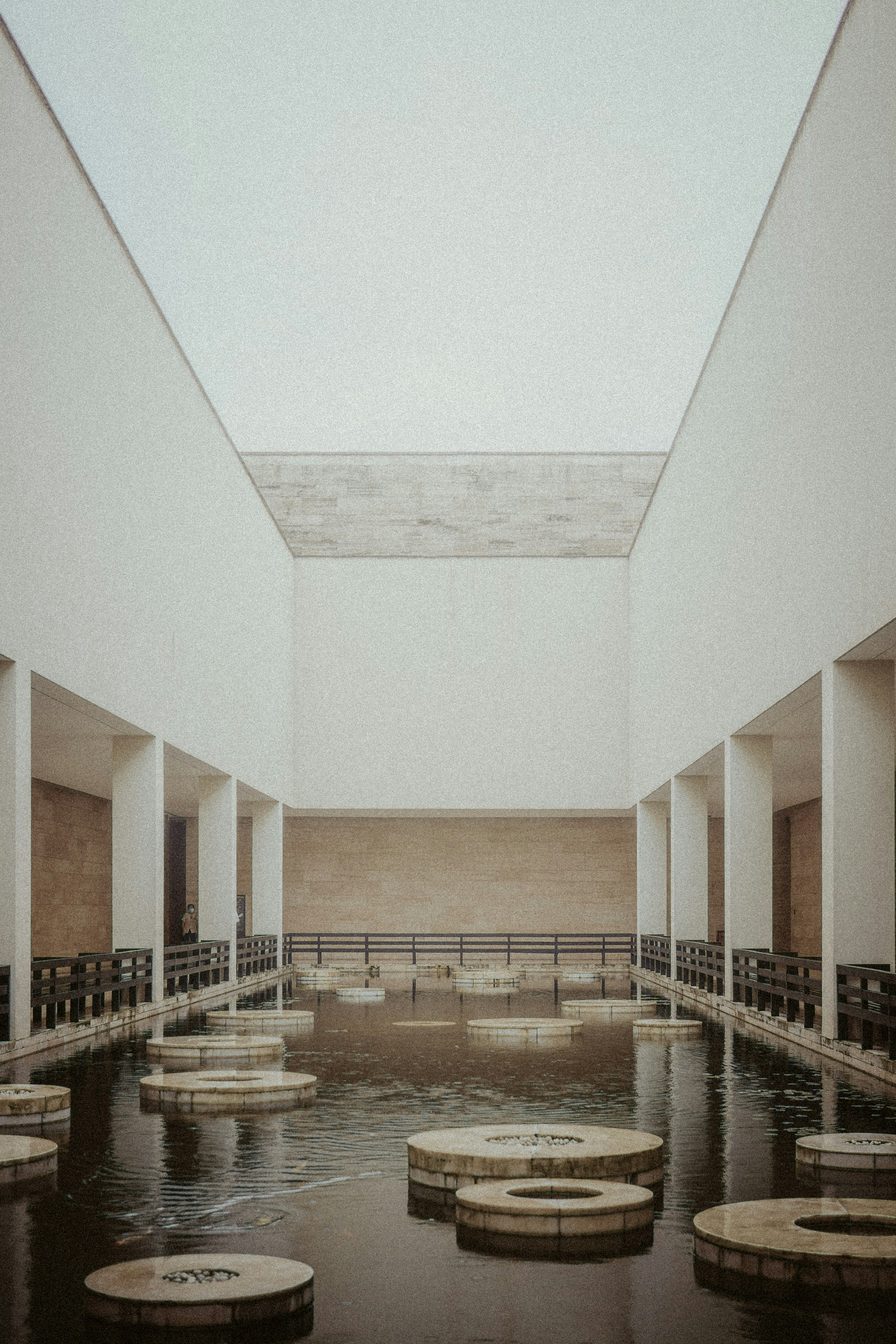 white concrete building with staircase