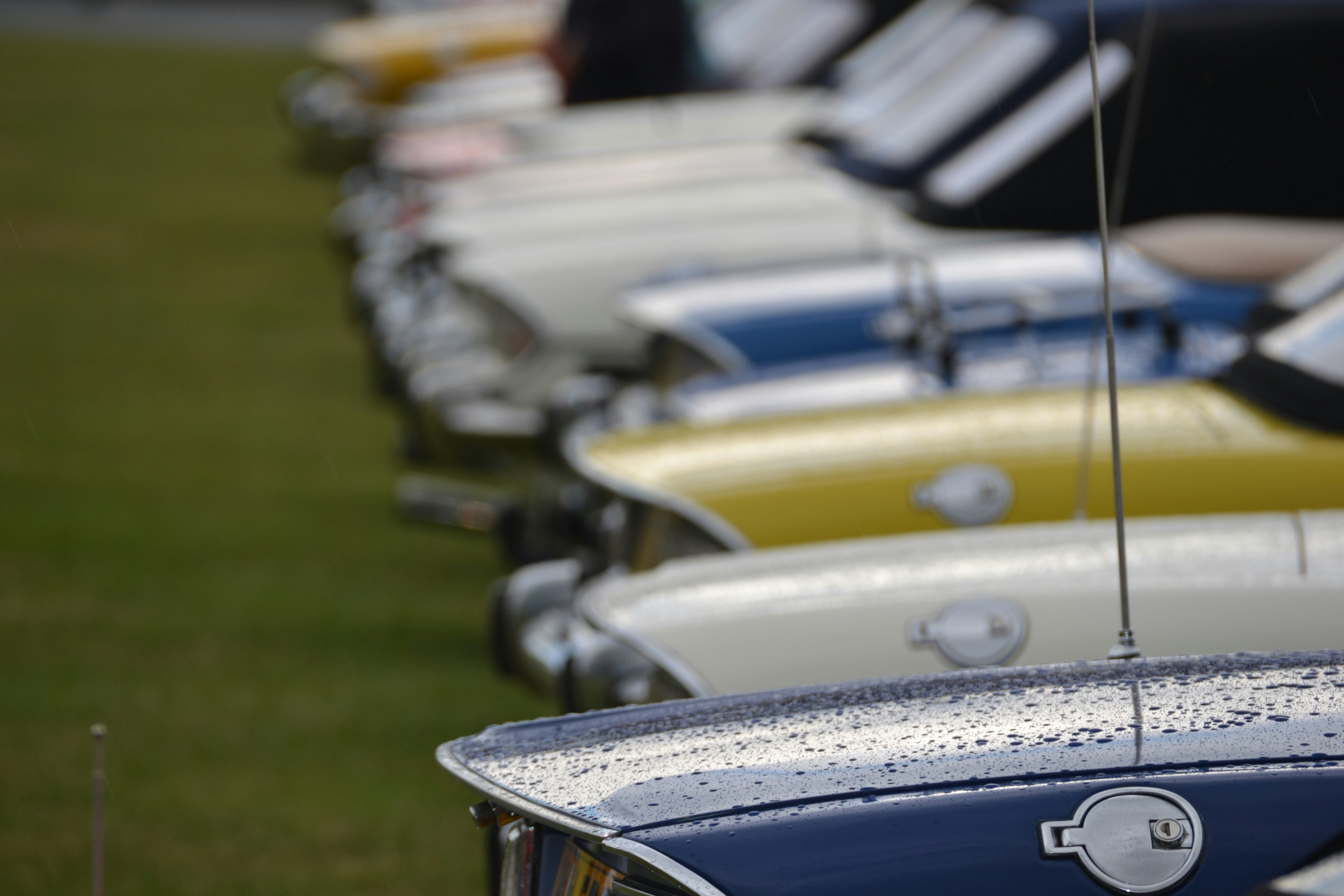 Row of Classic Boats: Raindrops on the Foredeck