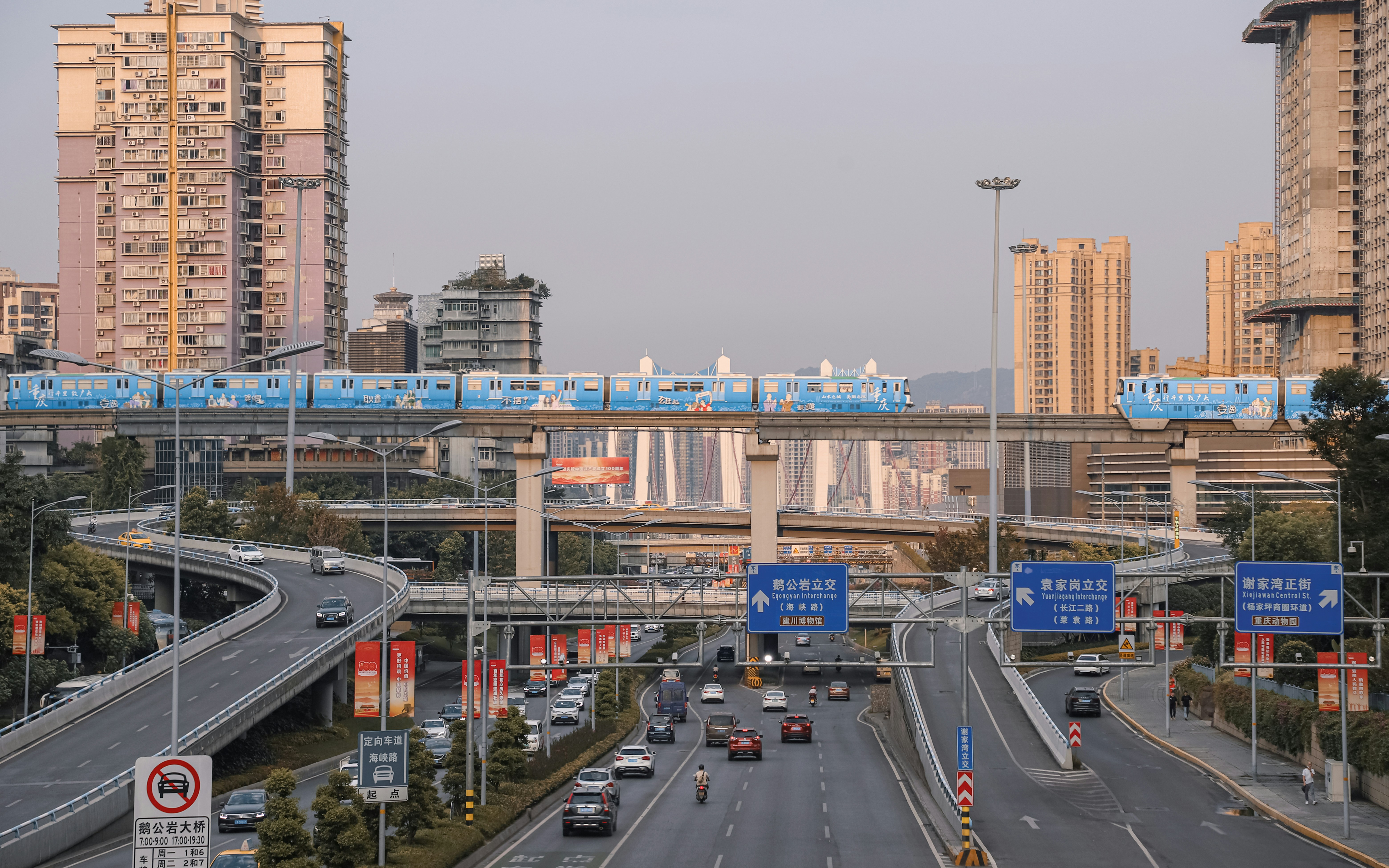 A highway with a train going over it photo – Free Chongqing Image on ...