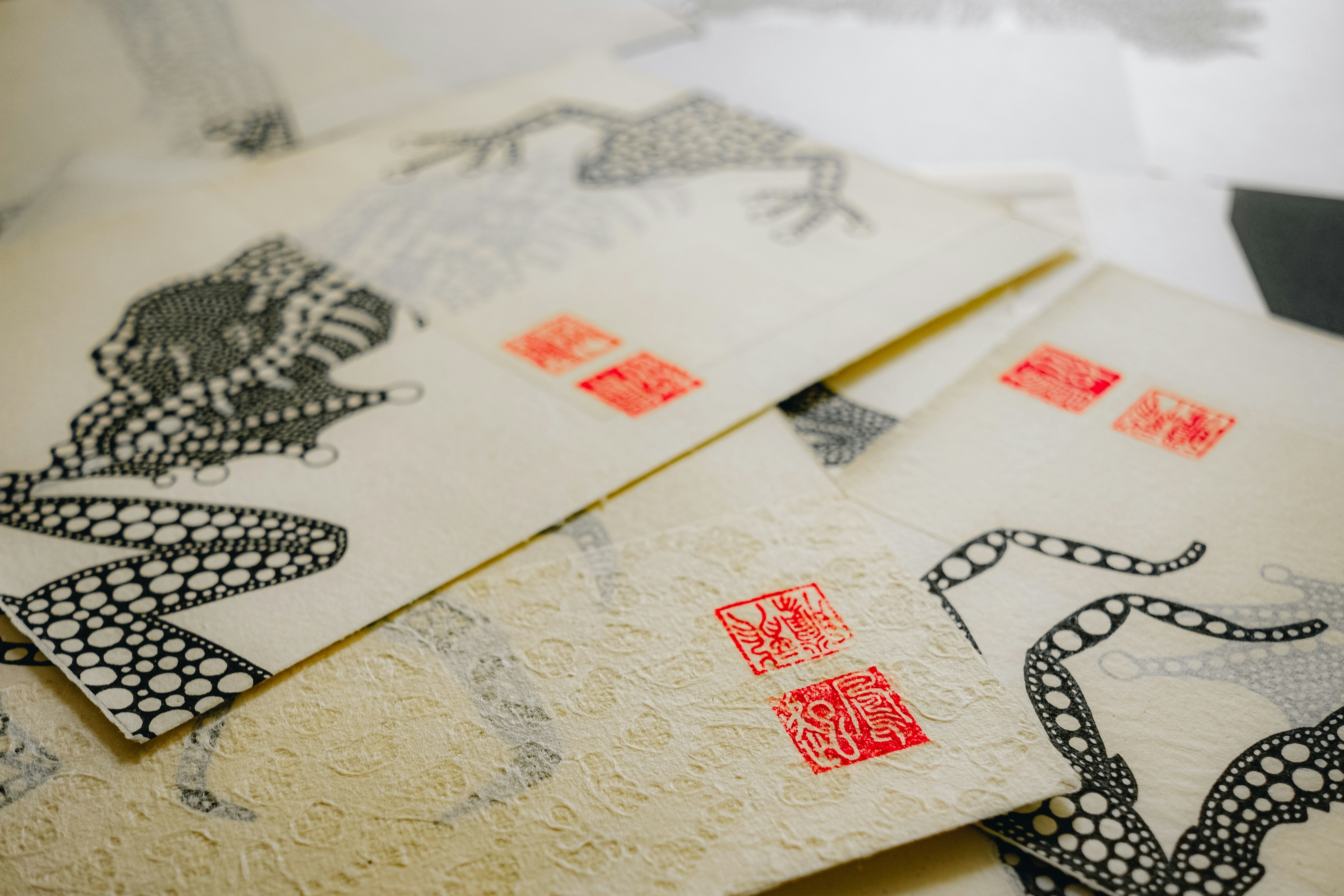 Lace-Lizard Cards with Crimson Seals: A Quiet Paper Still Life