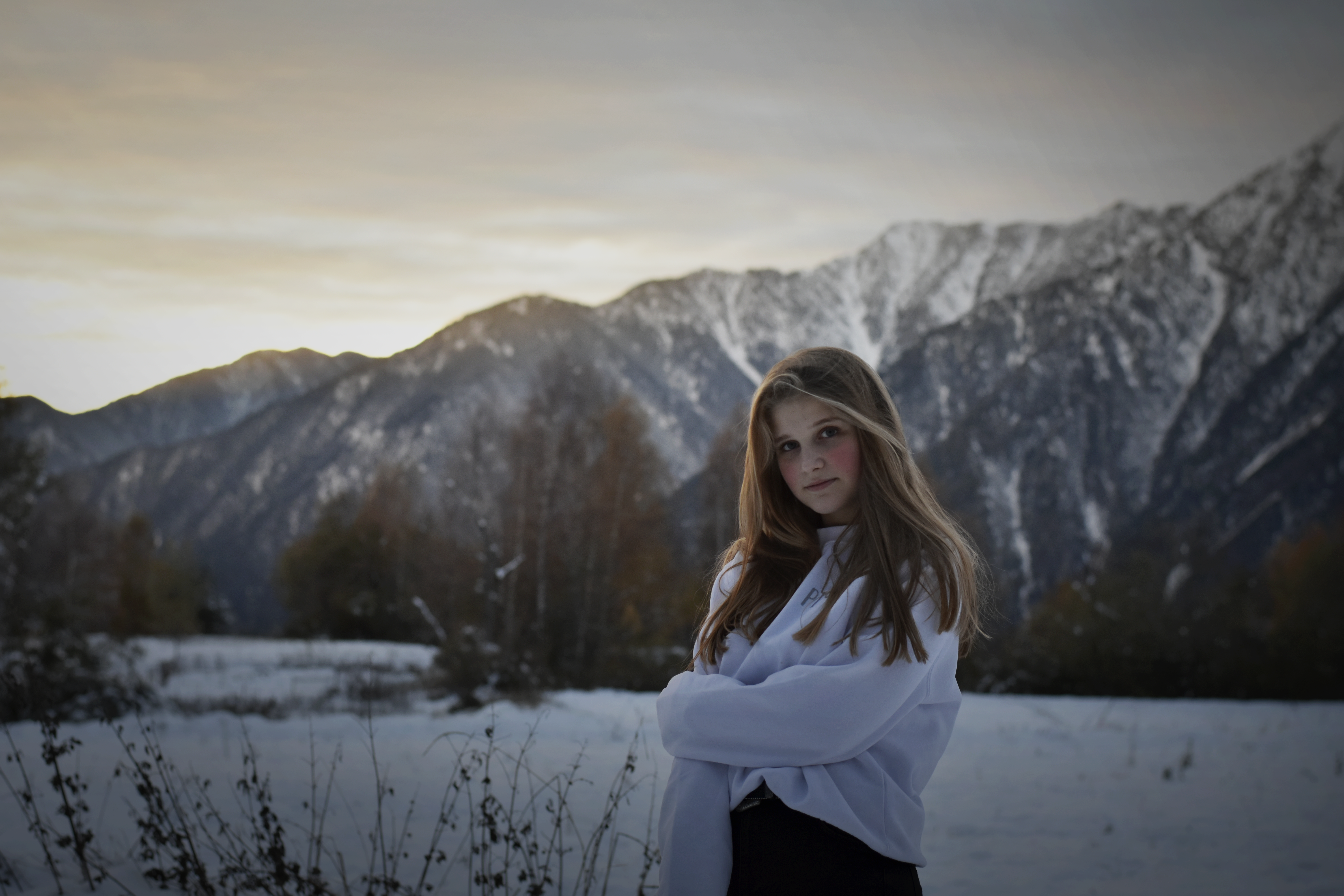 Snowbound Portrait: Soft Alpine Light Framing a Snow-Blanketed Valley