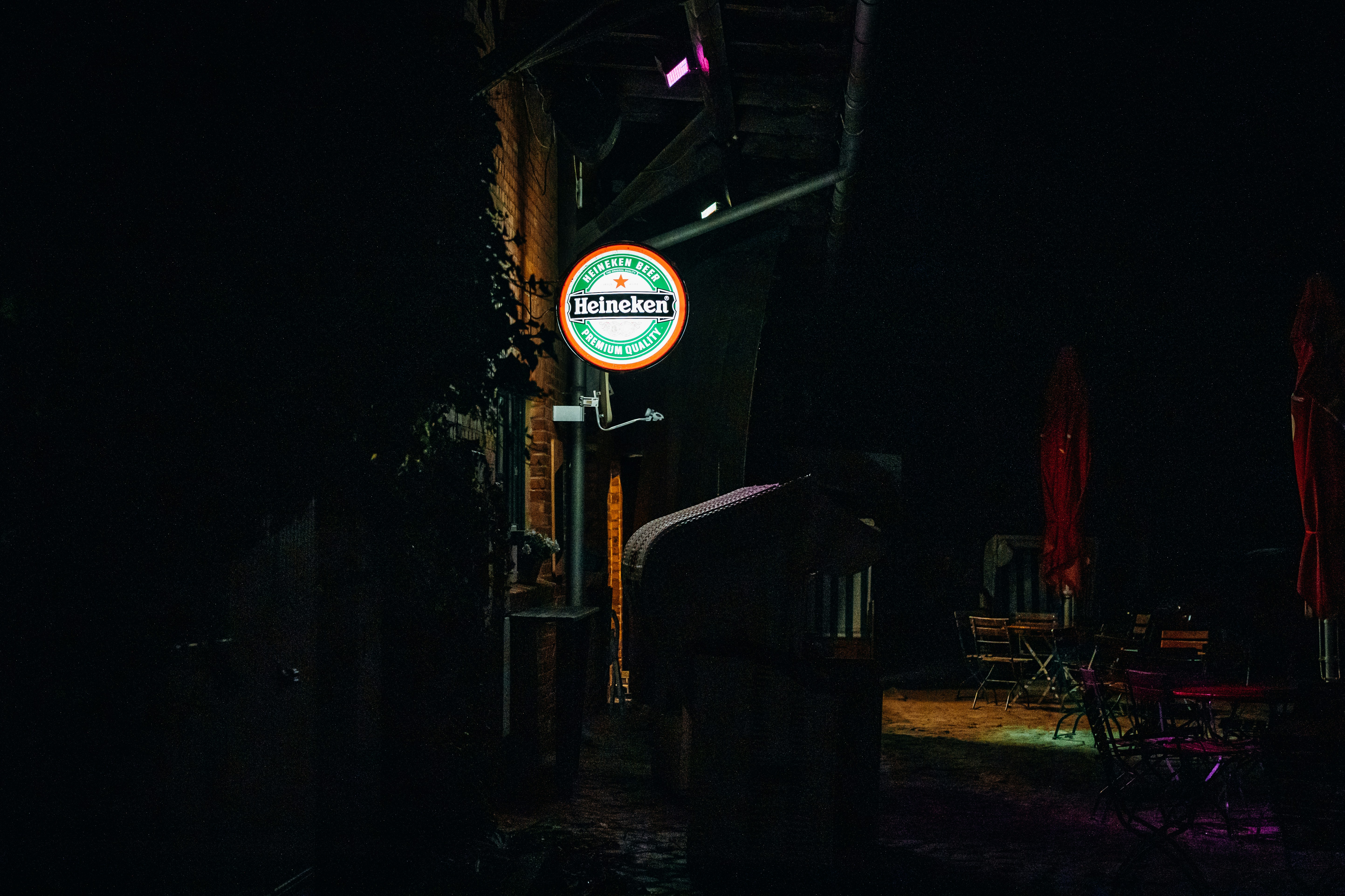 Red and white street sign during nighttime photo – Free Night Image on ...