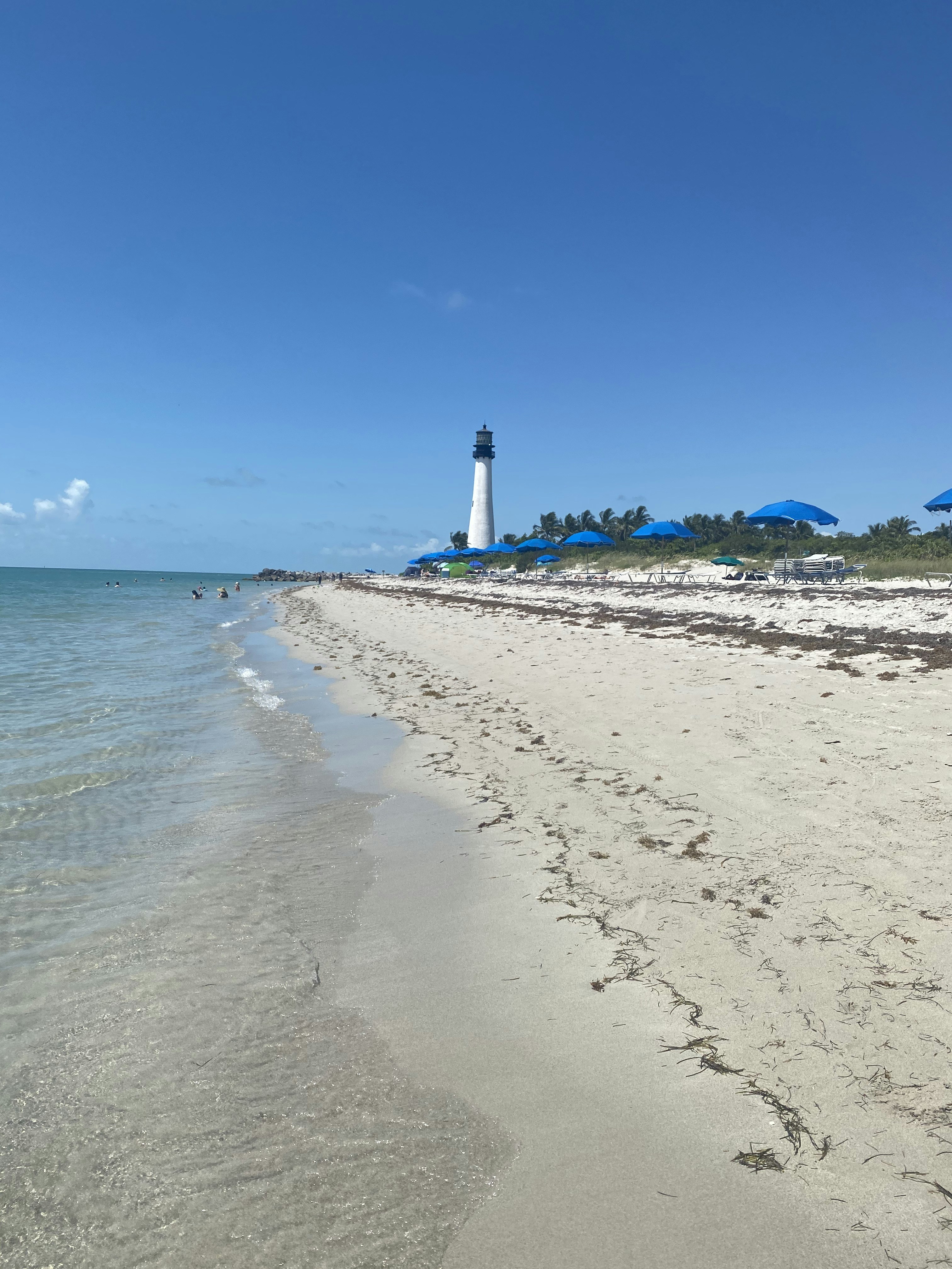 Beacon on White Sands: A Coastal Vista