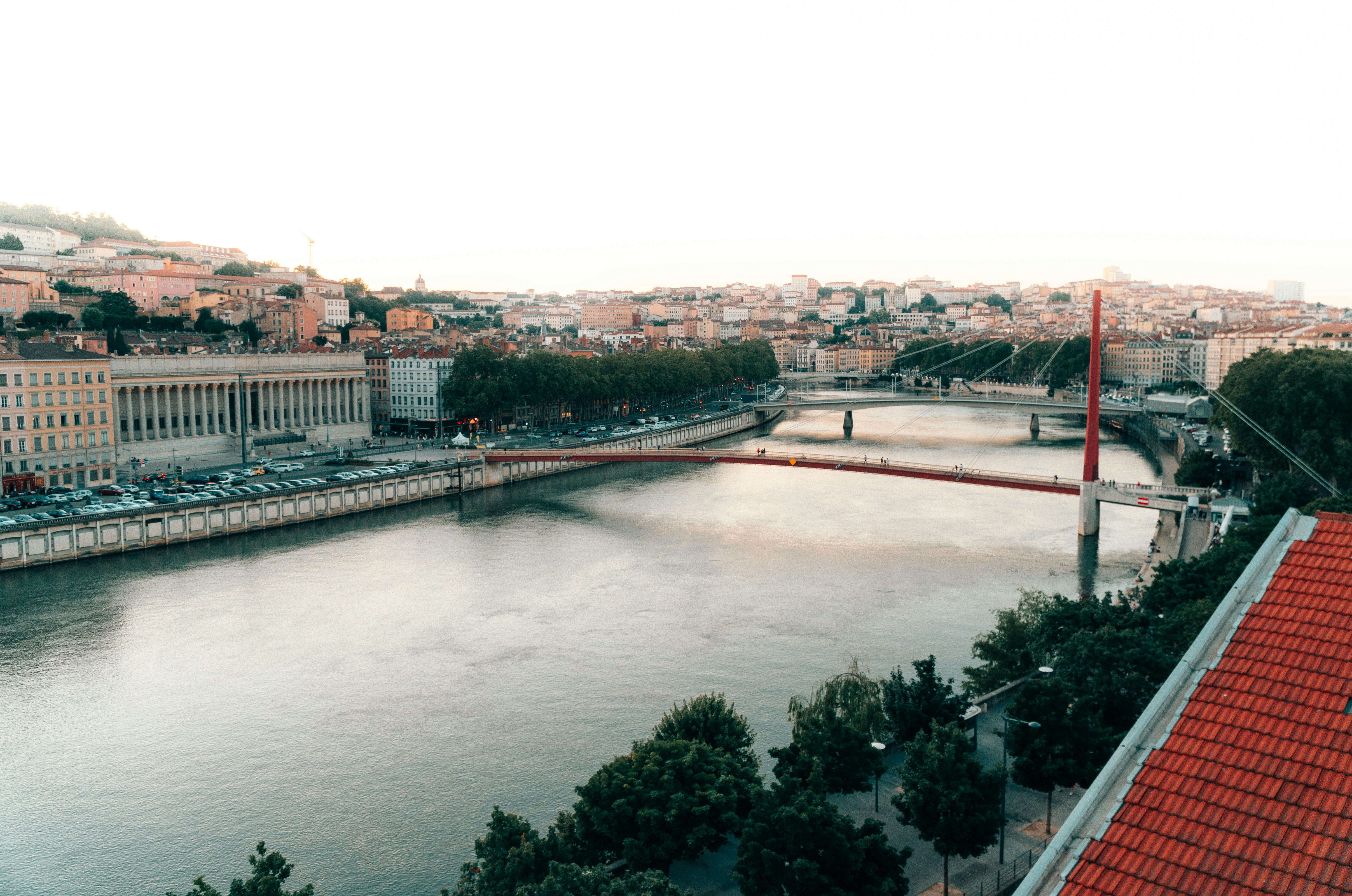 Riverside Bridge Corridor over a Calm European City