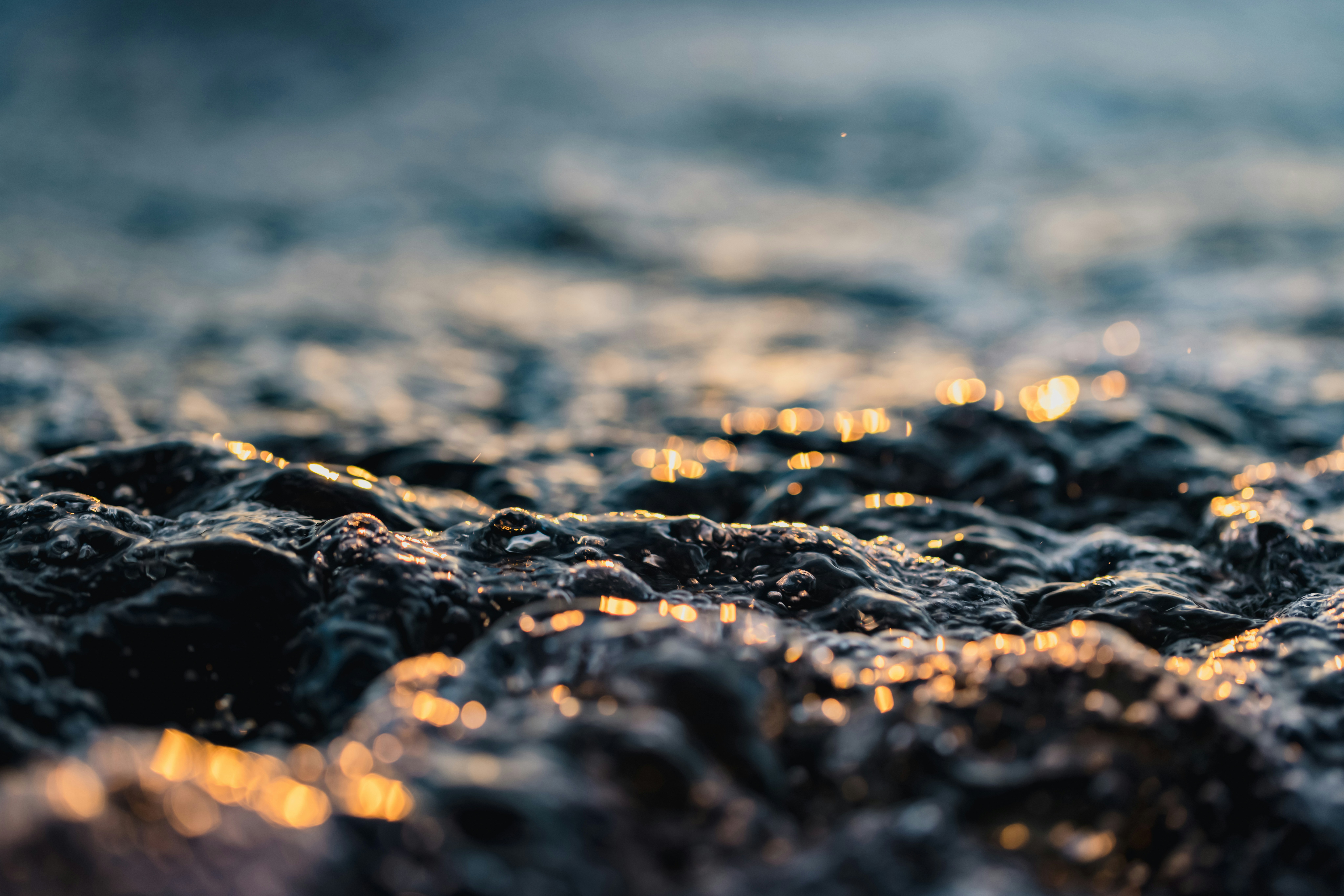 Water droplets on black rocks photo – Free Tar Image on Unsplash