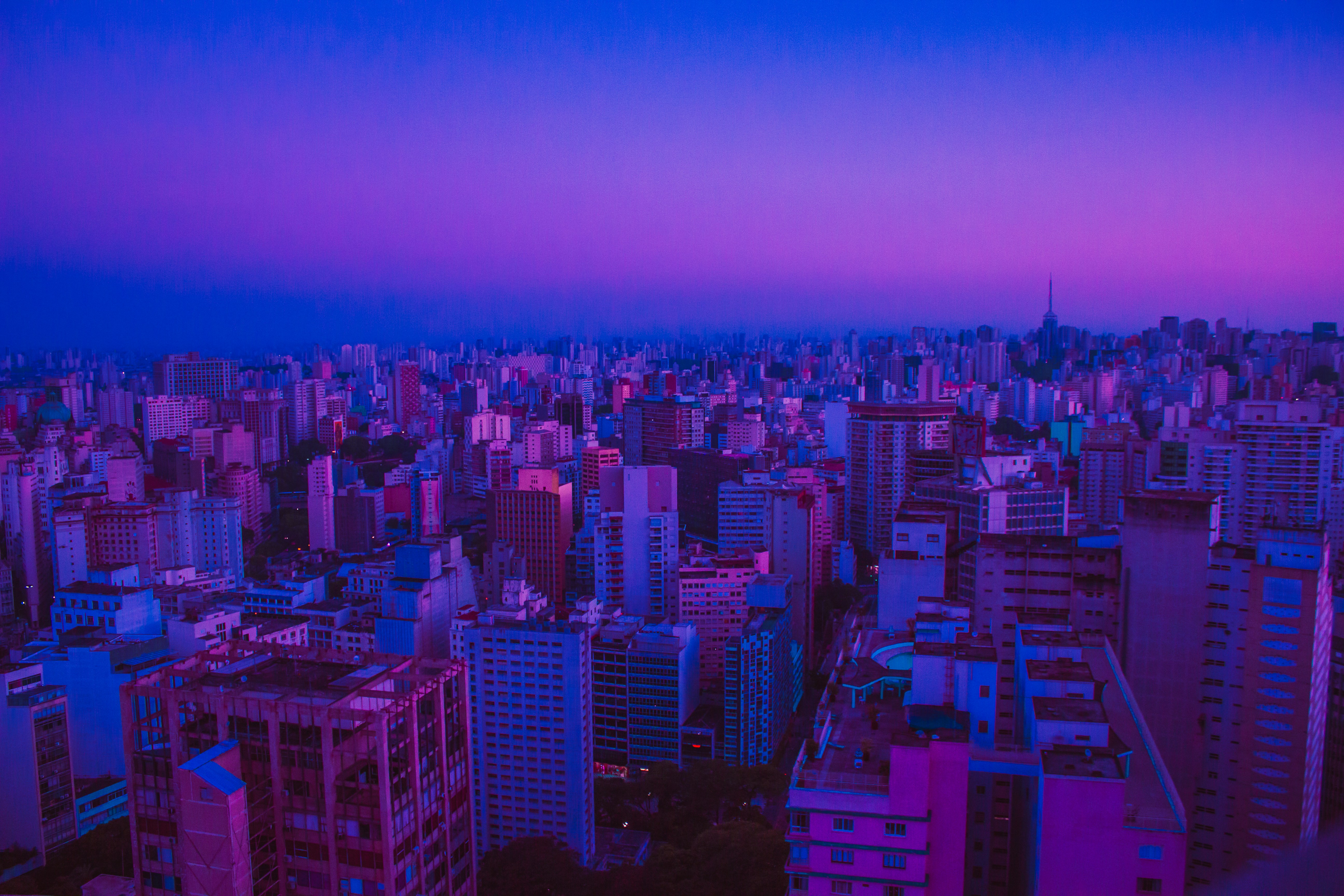 a view of a city with tall buildings