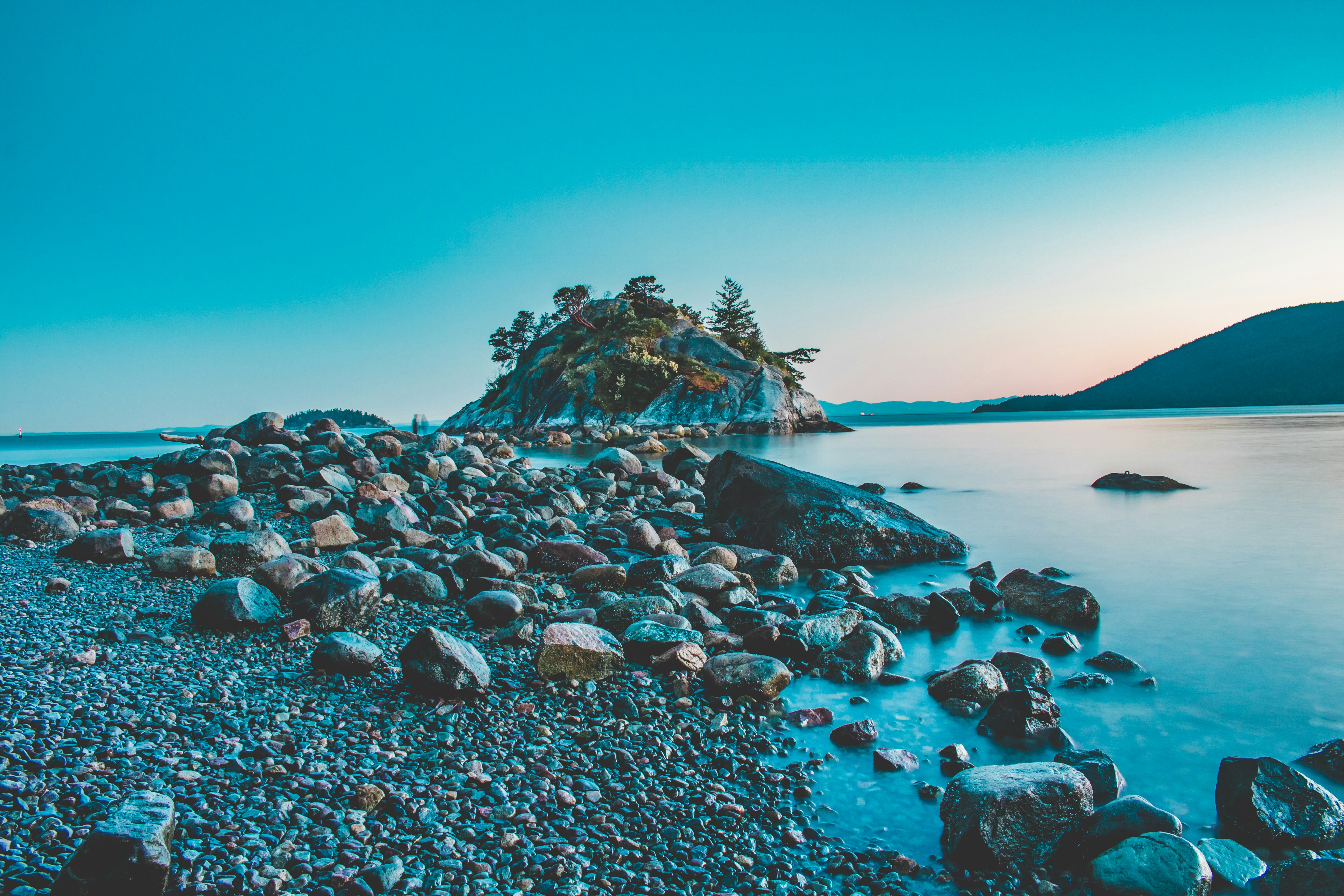 Rocky shore with rocks on the sea during daytime photo – Free Shoreline ...