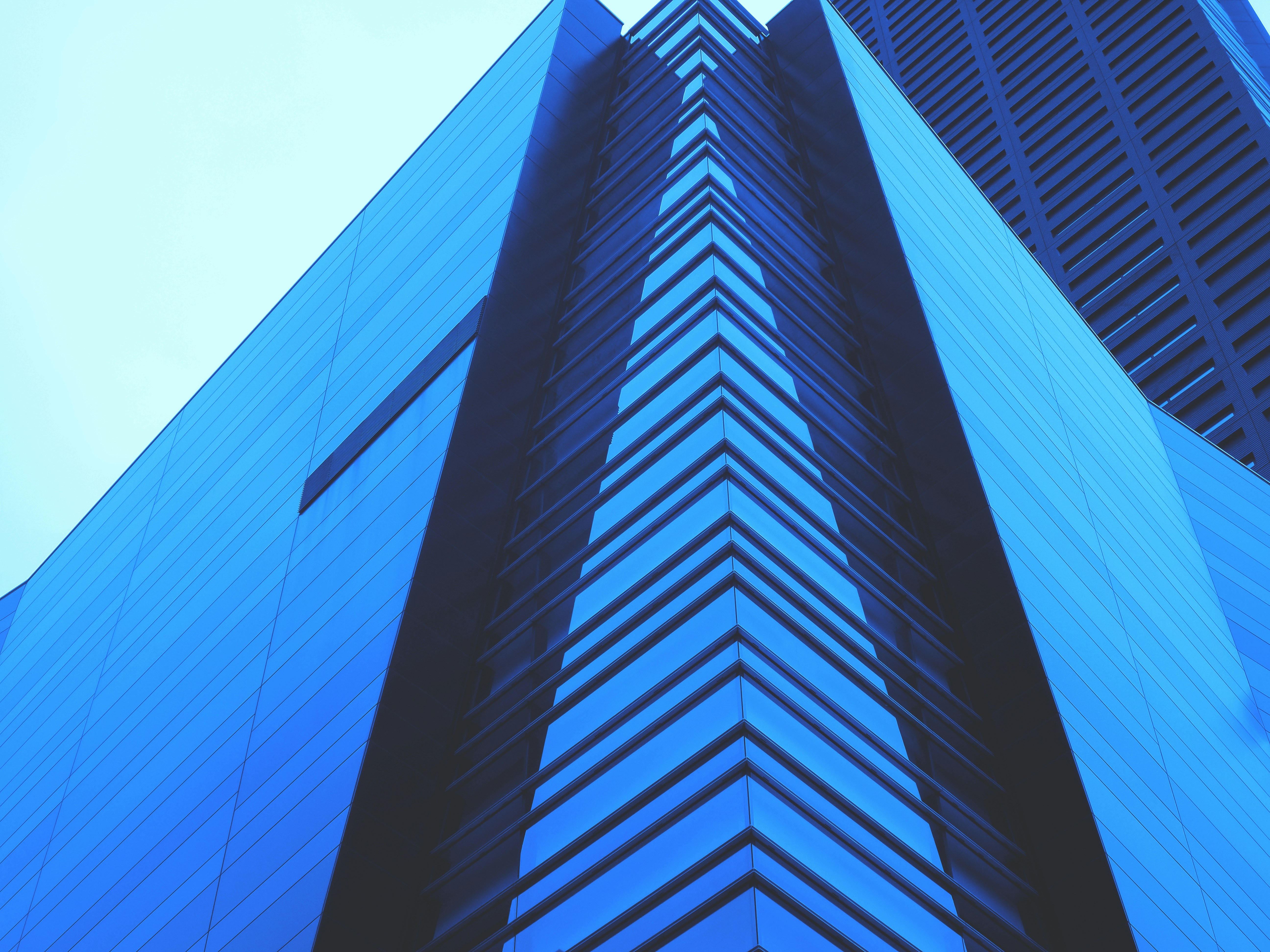 A tall blue building with a sky background photo – Free Cyberpunk Image ...