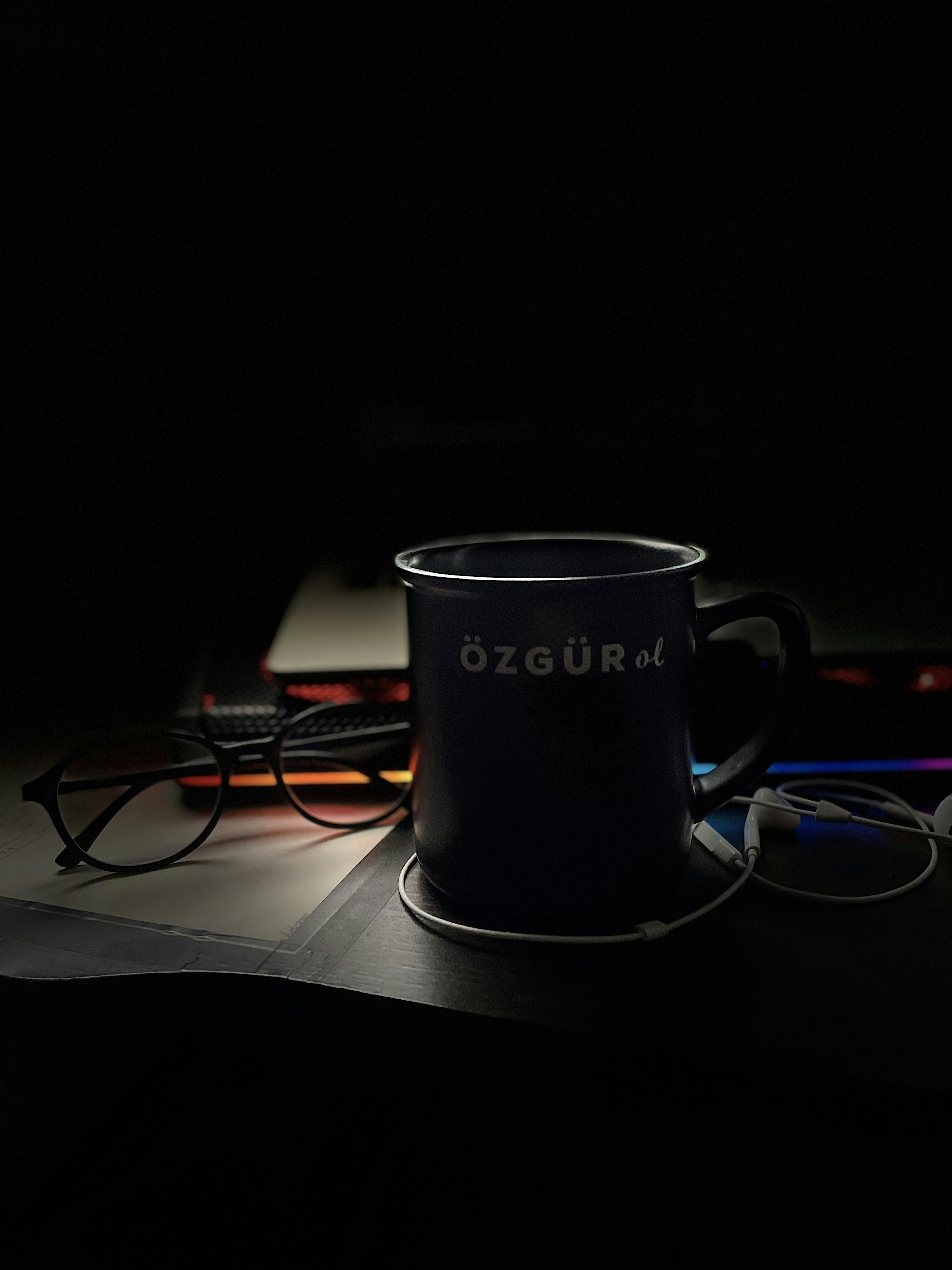 Moonlit Mug: Özgür on a Quiet Desk