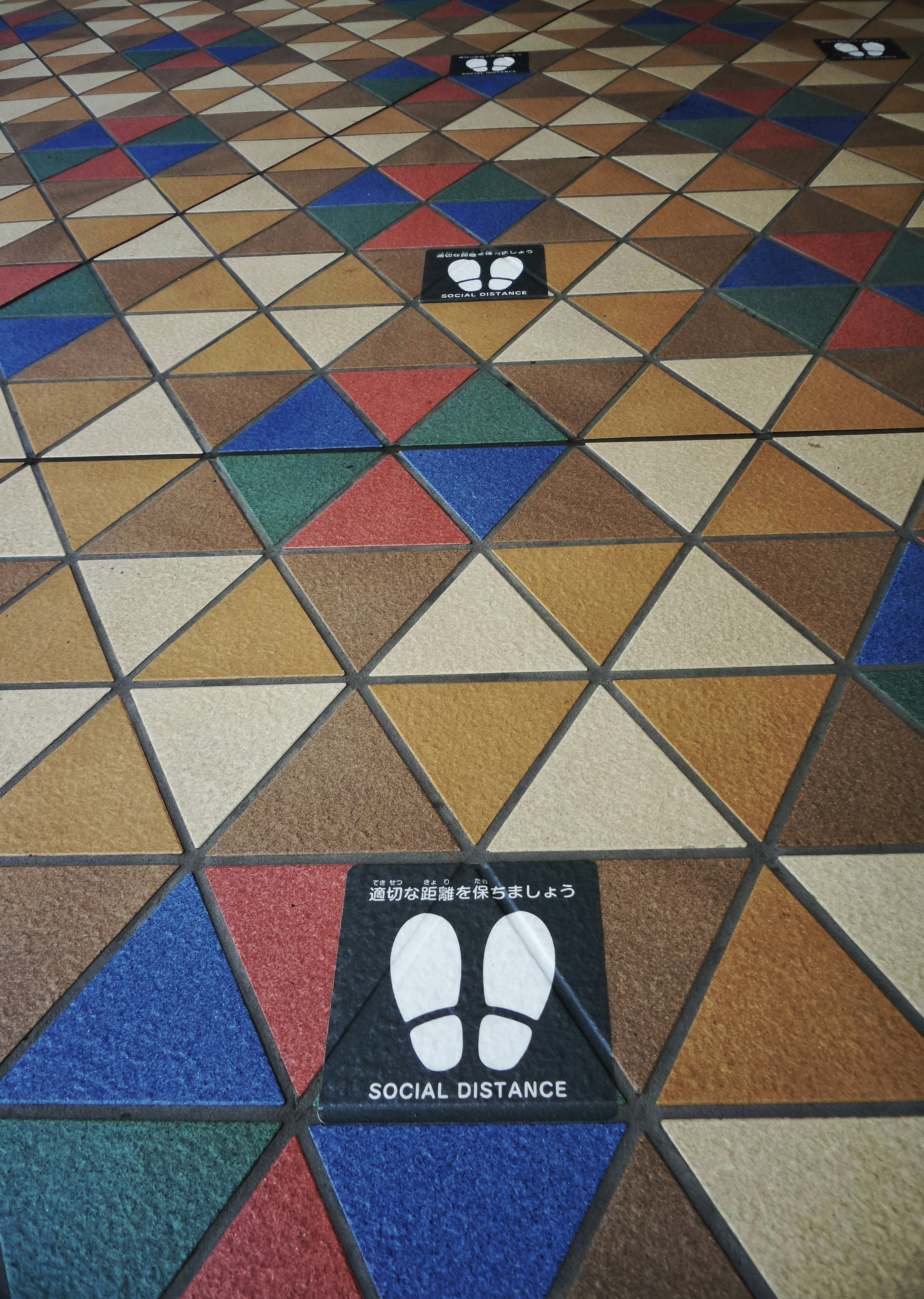Brown blue and red square floor tiles photo – Free Floor Image on Unsplash