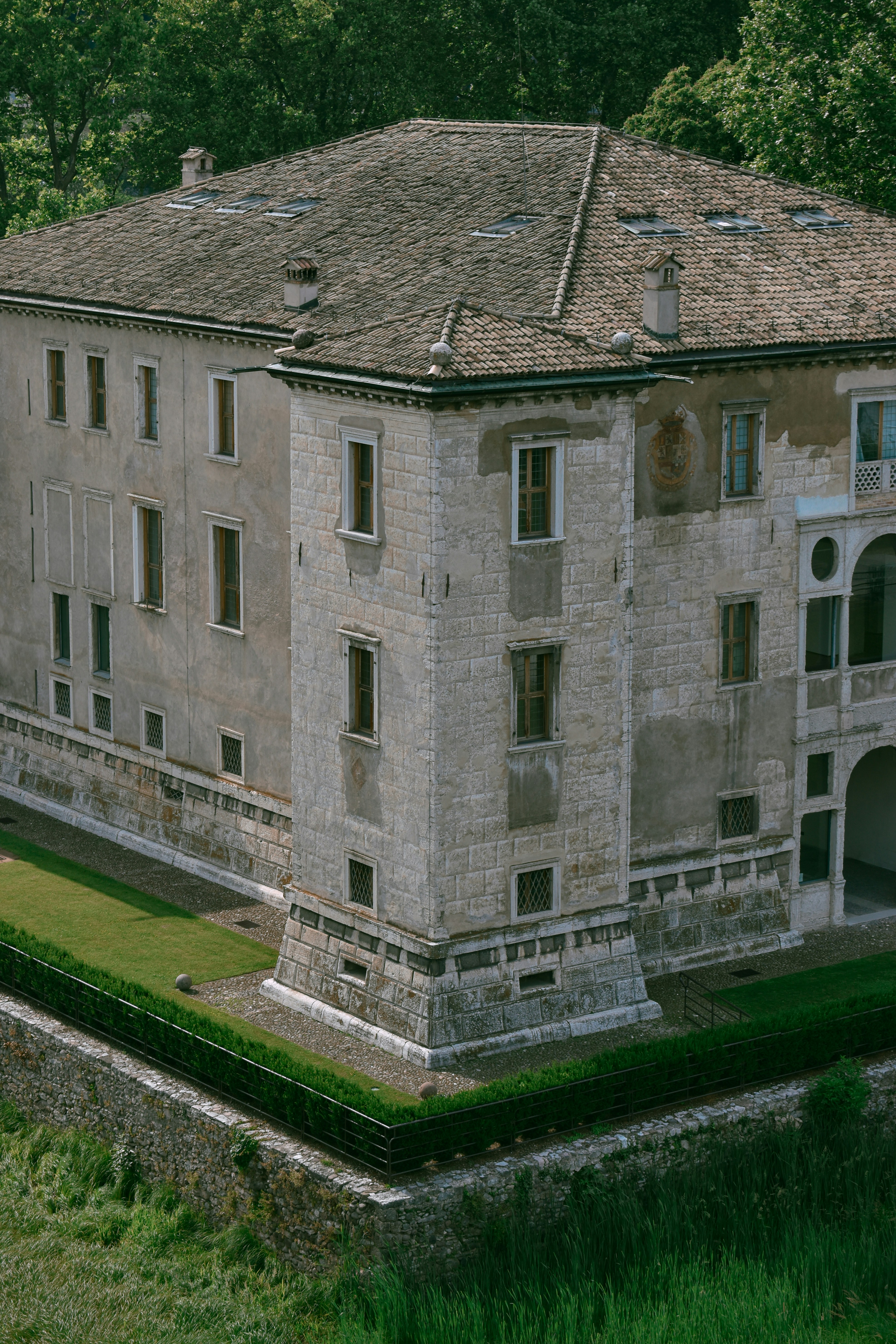 Stone Fortress: Corner of the Manor Rising from the Green Banks