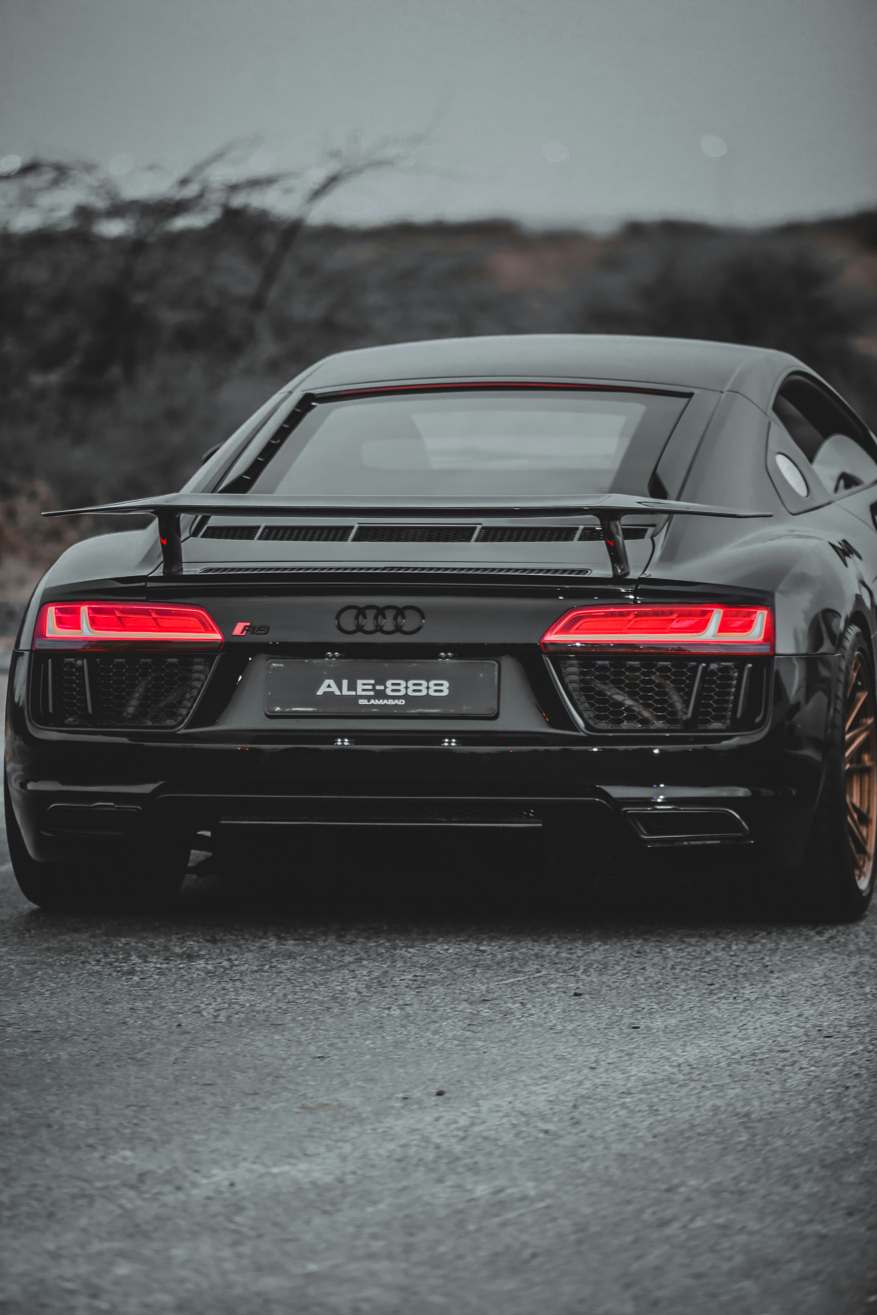 Black audi r 8 on road during daytime photo – Free Pakistan Image on ...