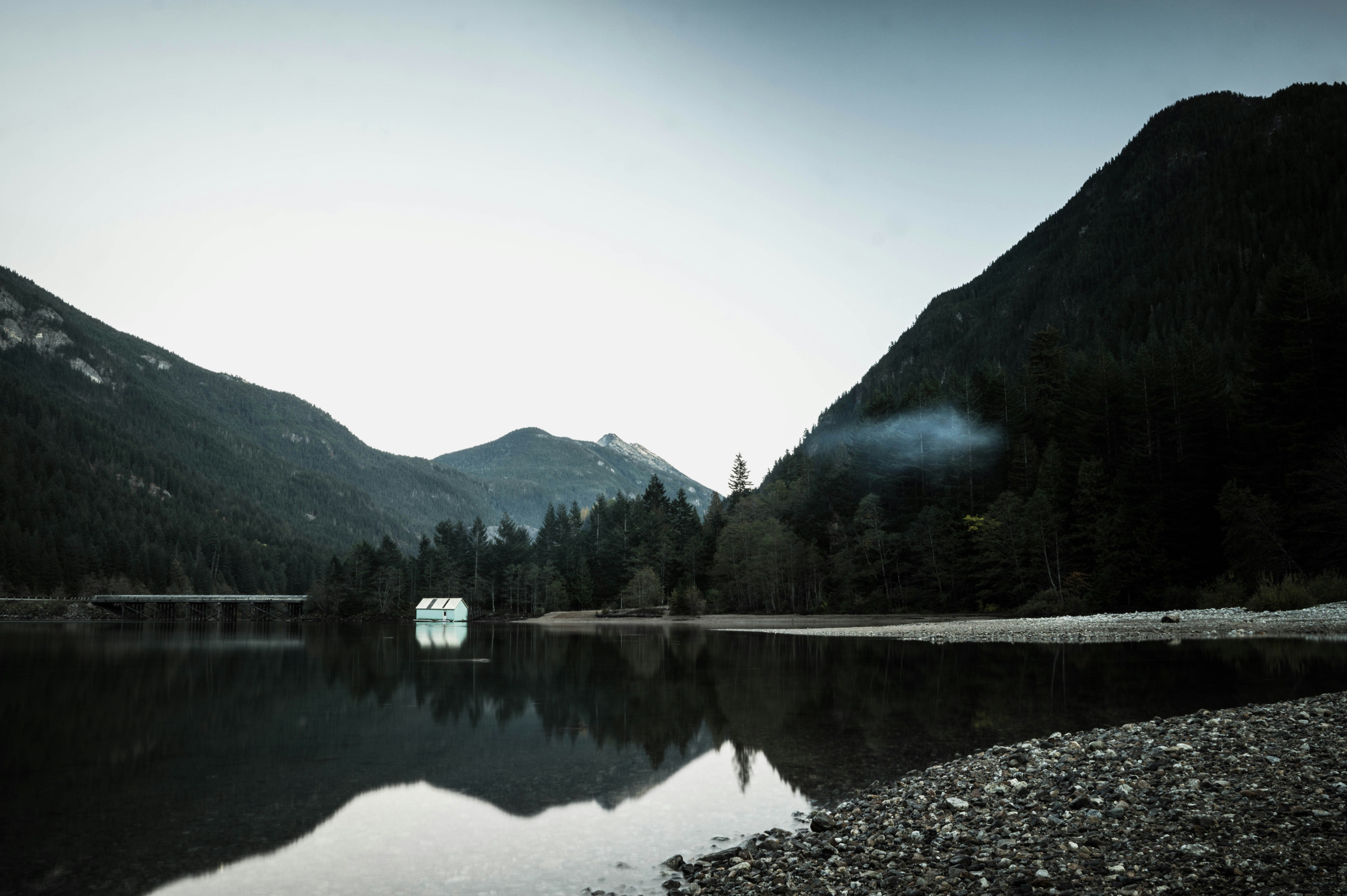 Serene Reflections in Mountain Embrace
