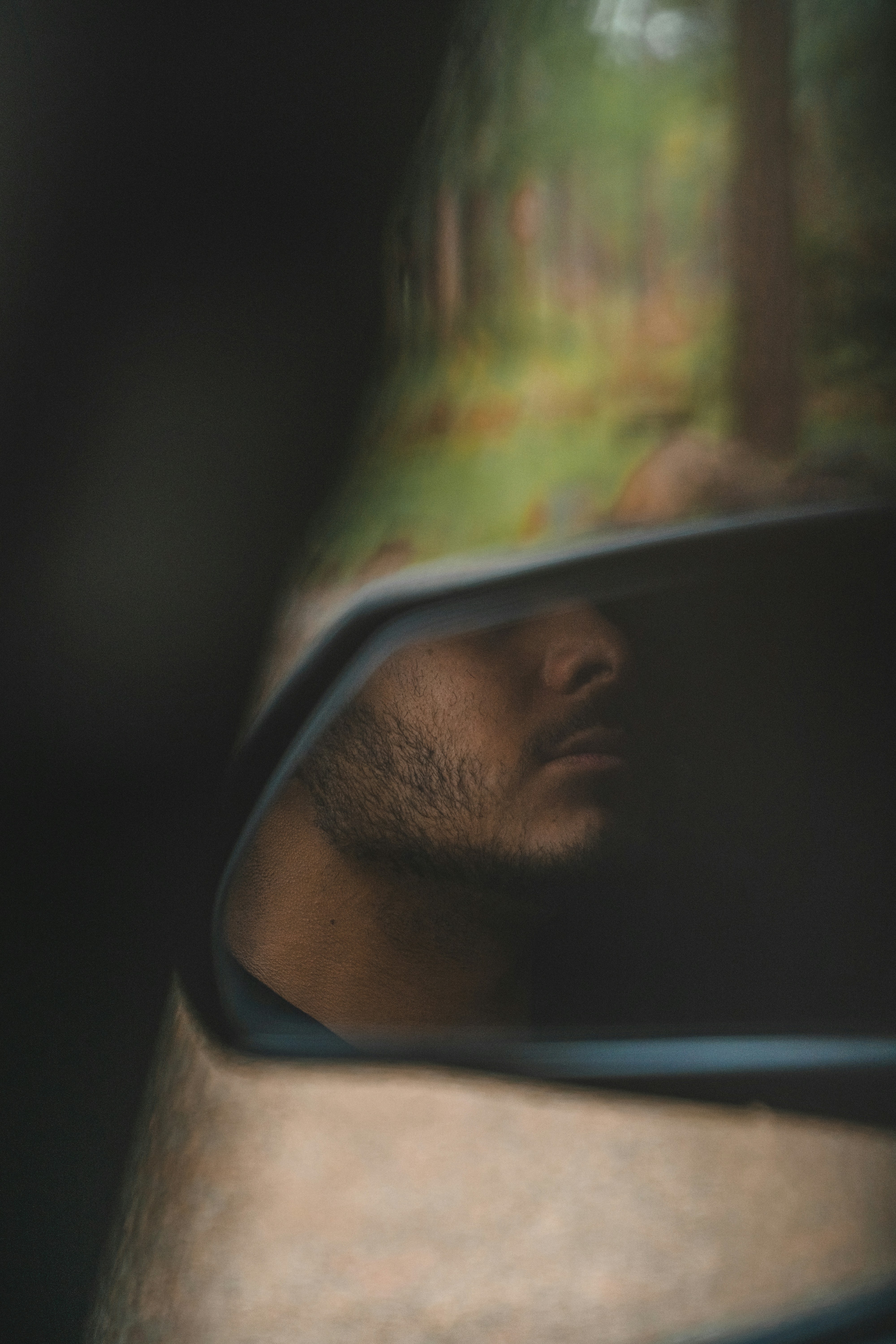 Side Mirror Silhouette: A Quiet Portrait in Transit