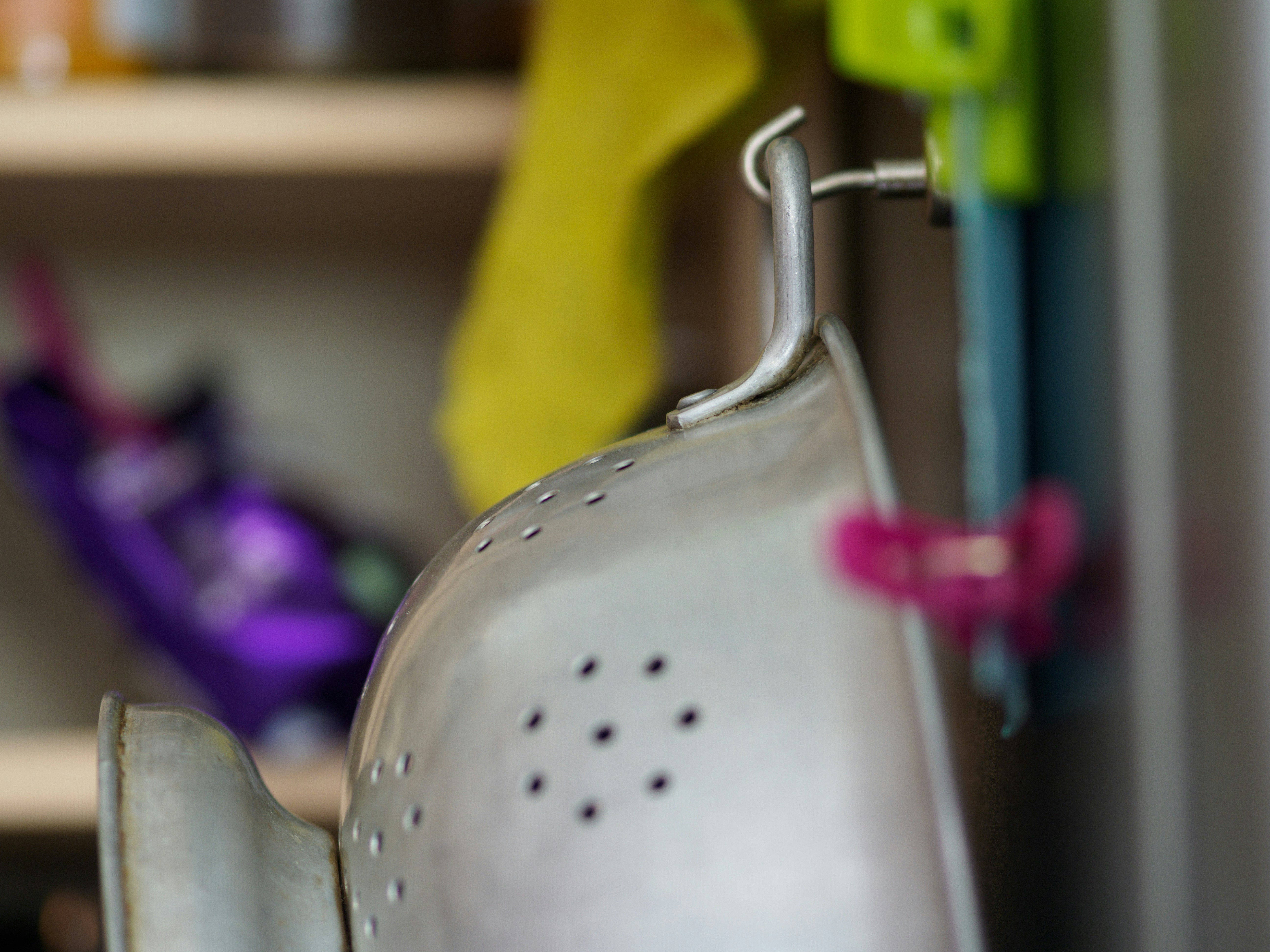 Vintage Steam Iron Amid a Cluttered Workshop