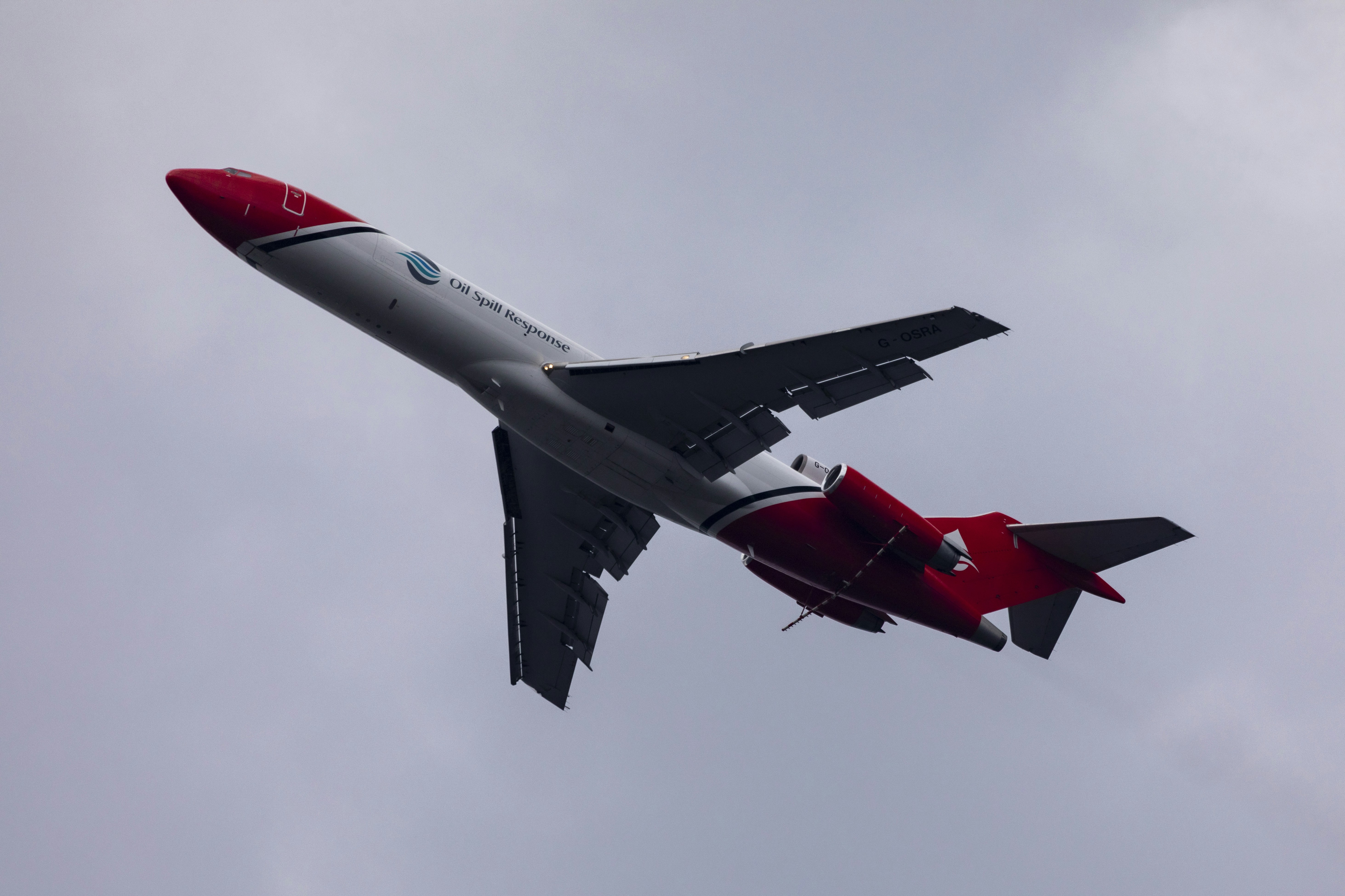 Red and white jet plane in mid air photo – Free Uk Image on Unsplash