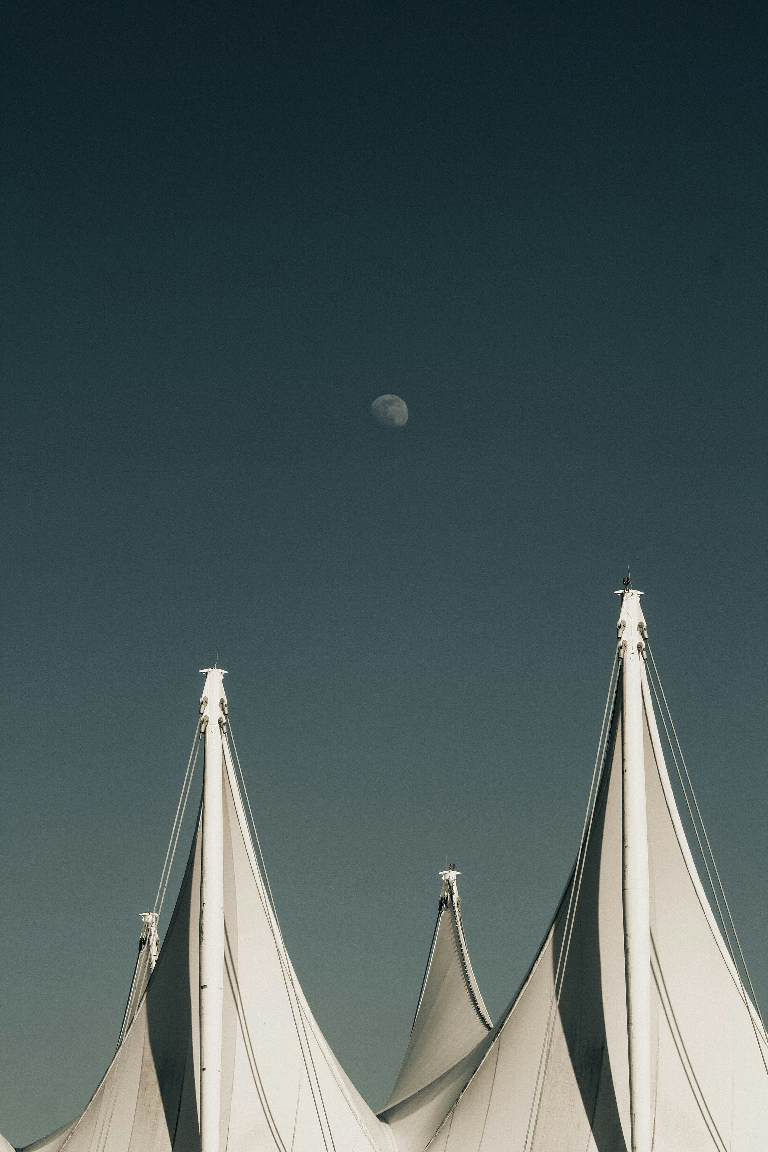 The upper side of Canada place, the port of Vancouver, under the moon.