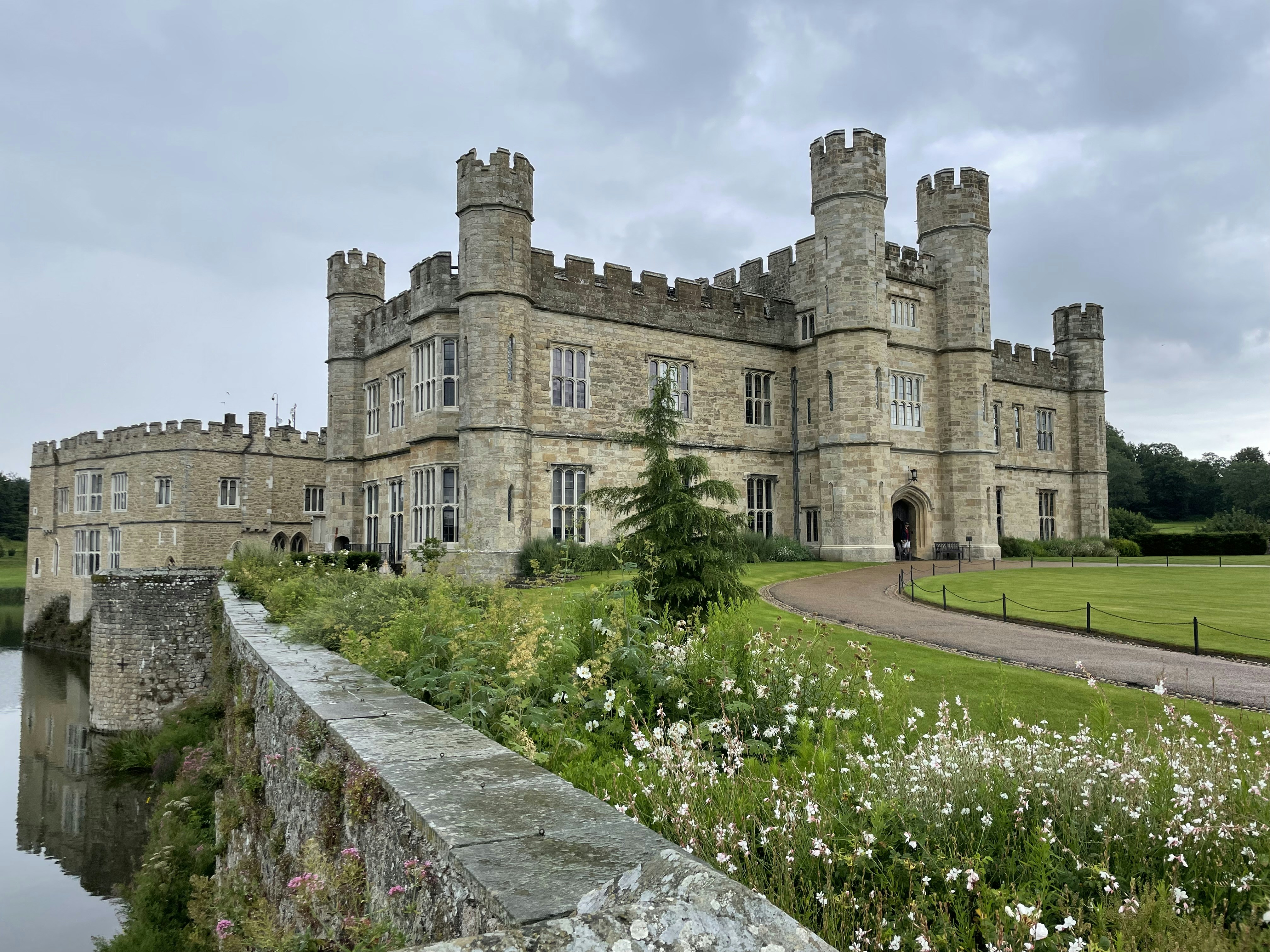 Leeds Castle | grey concrete castle near green grass field during daytime