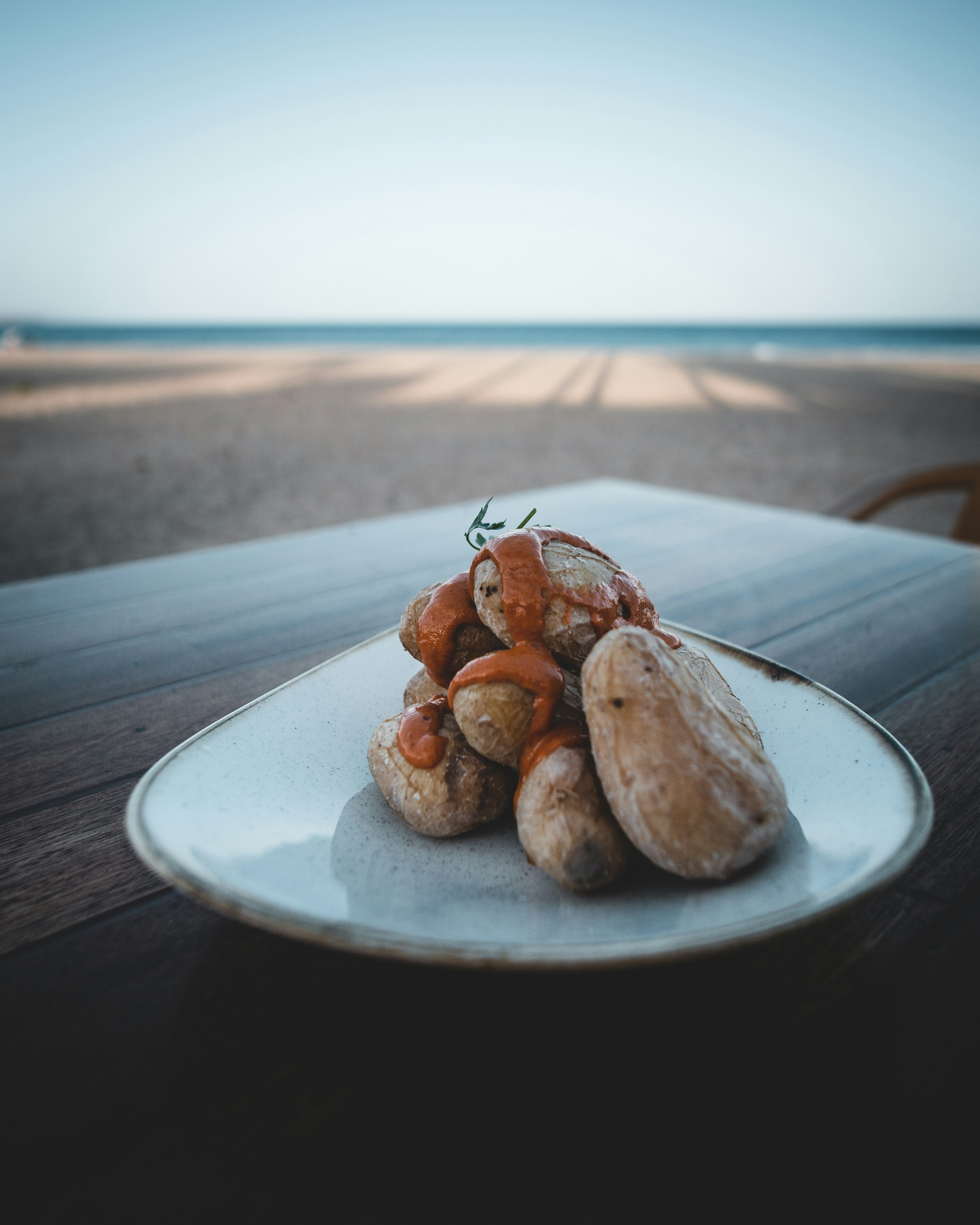 Crusty Coastline Bites on a Weathered Table