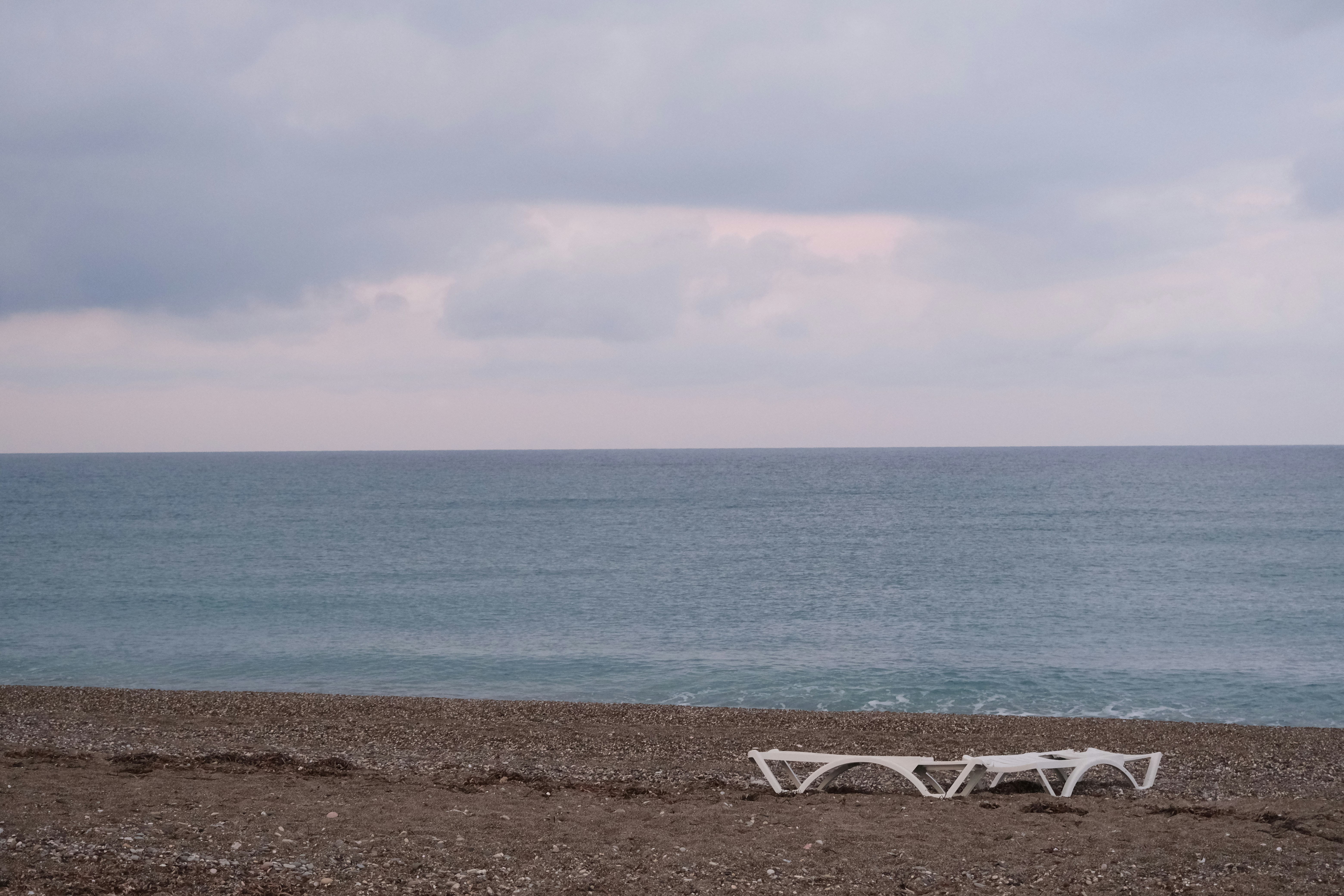 Tranquil Shores Under Overcast Skies