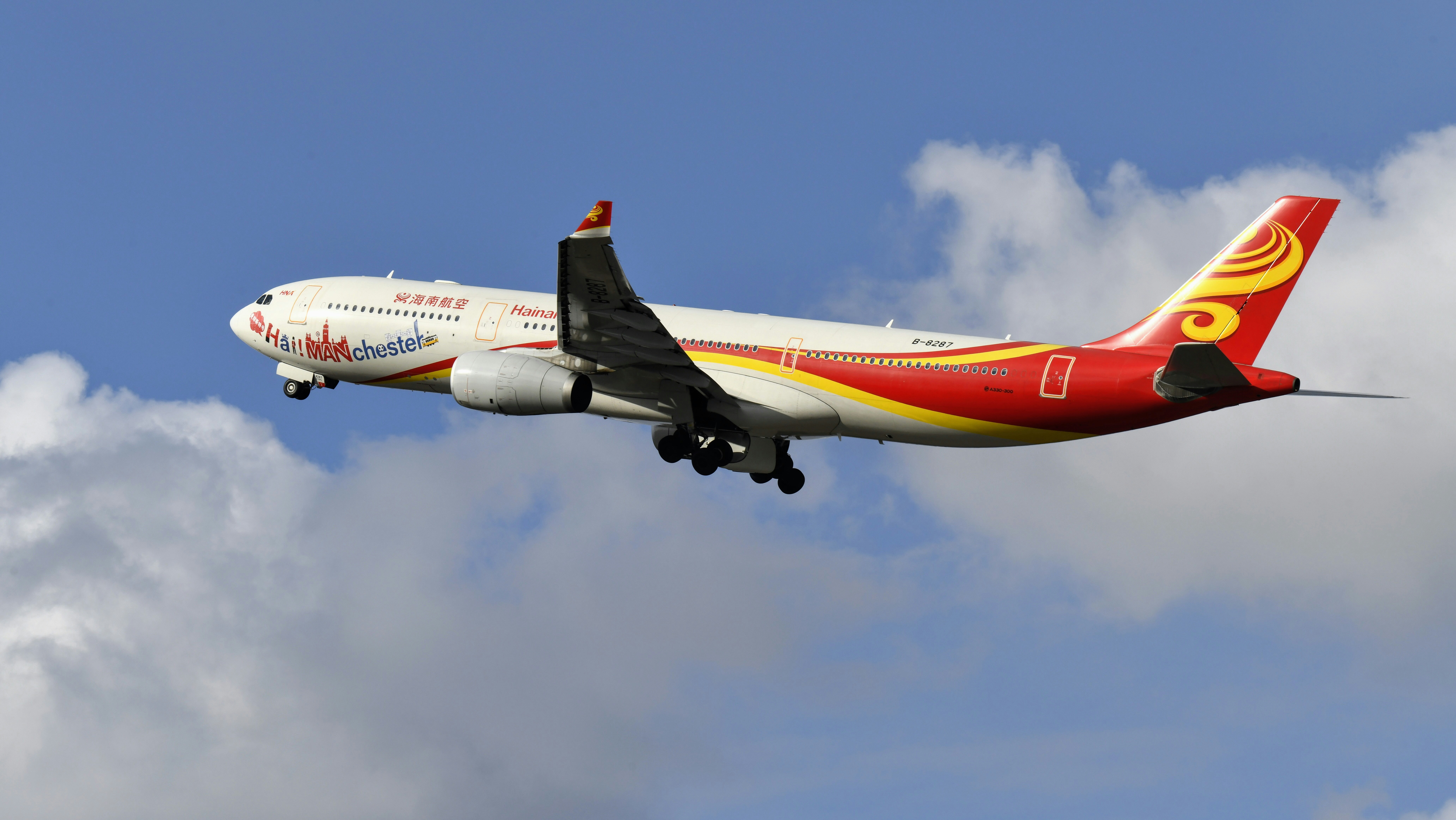 White and red air plane in the sky photo – Free Airplane Image on Unsplash