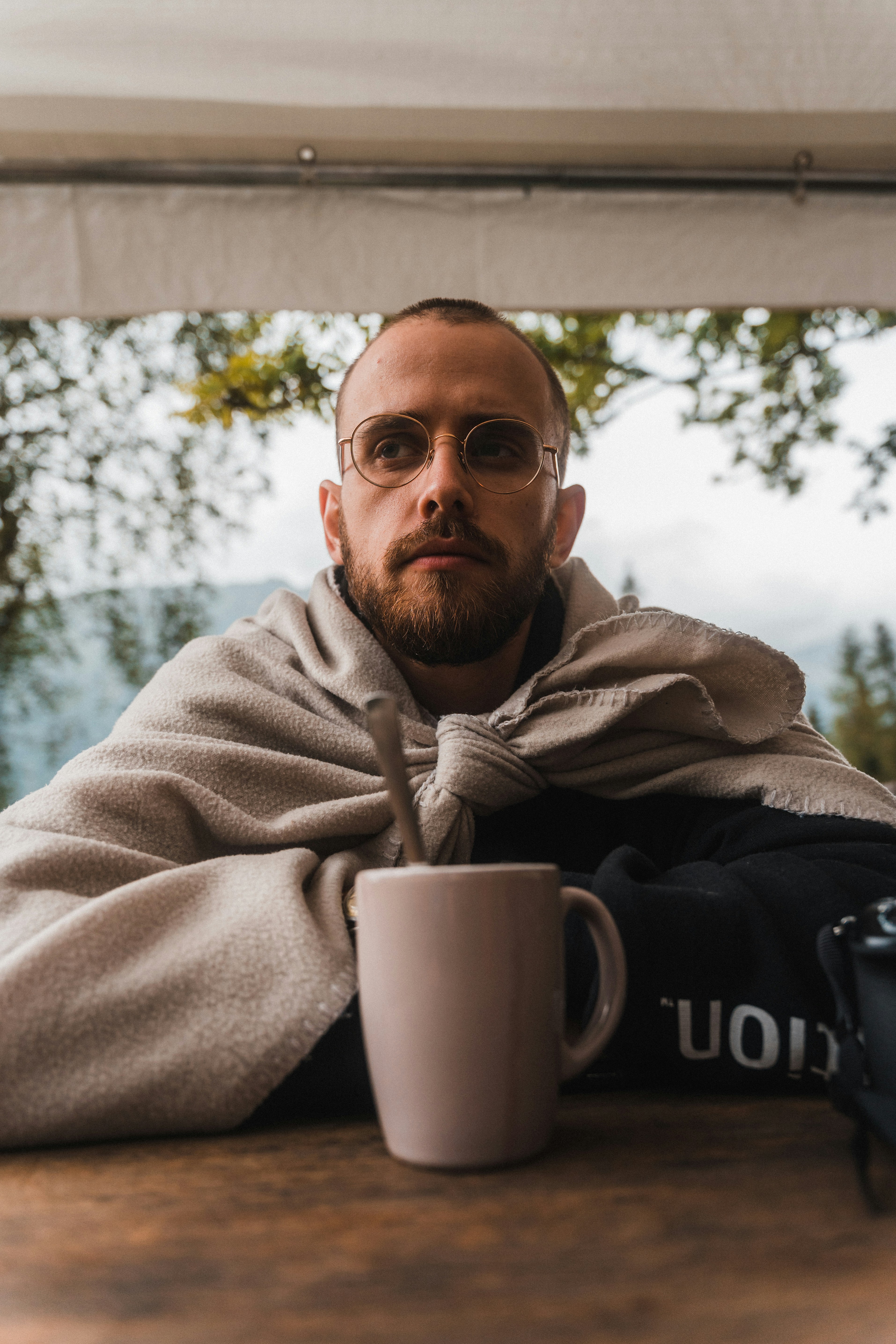 Cozy Camfire Gaze: Quiet Confidence Across the Table