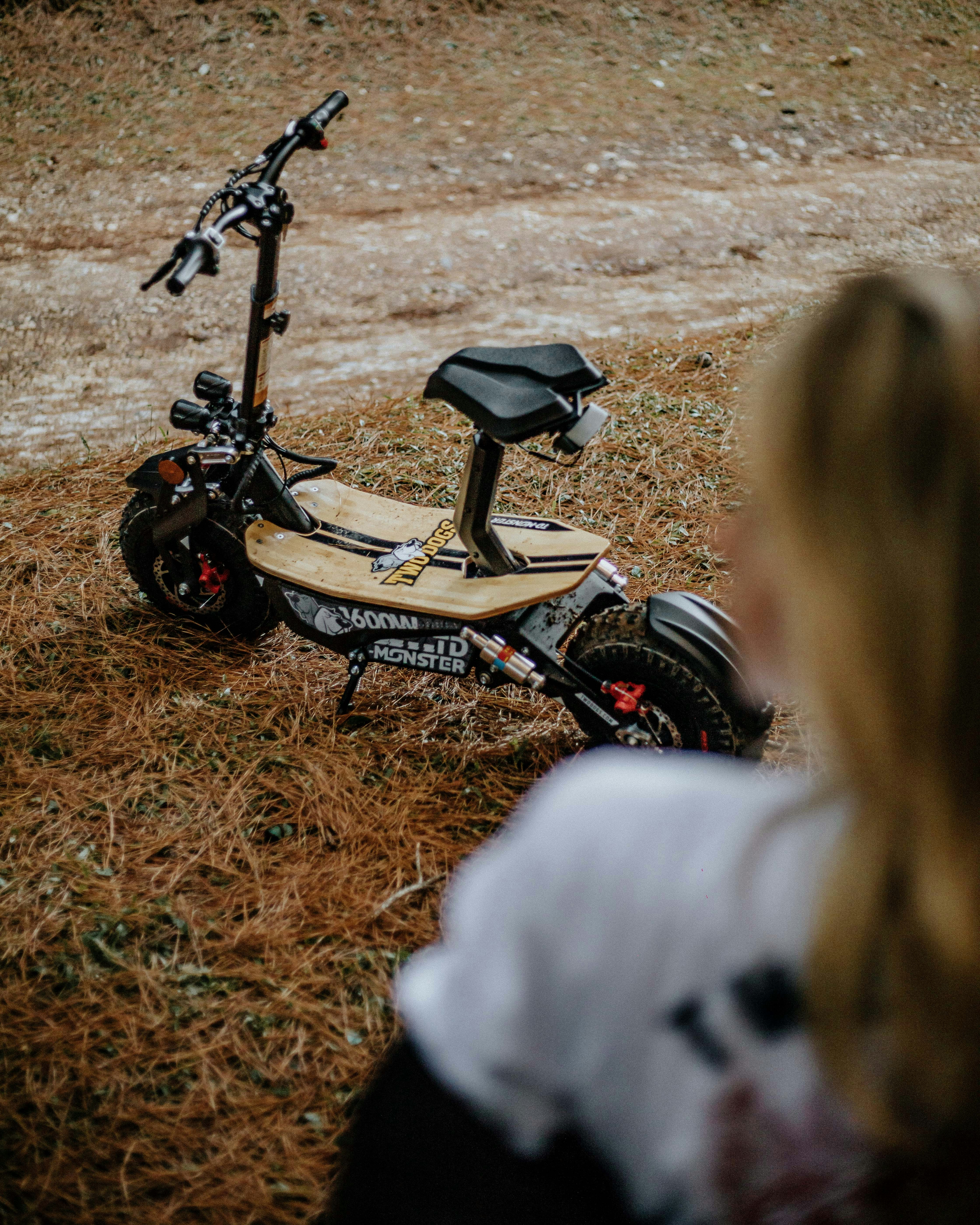 Electric Ride: A Riderless E-Scooter and a Blurred Figure