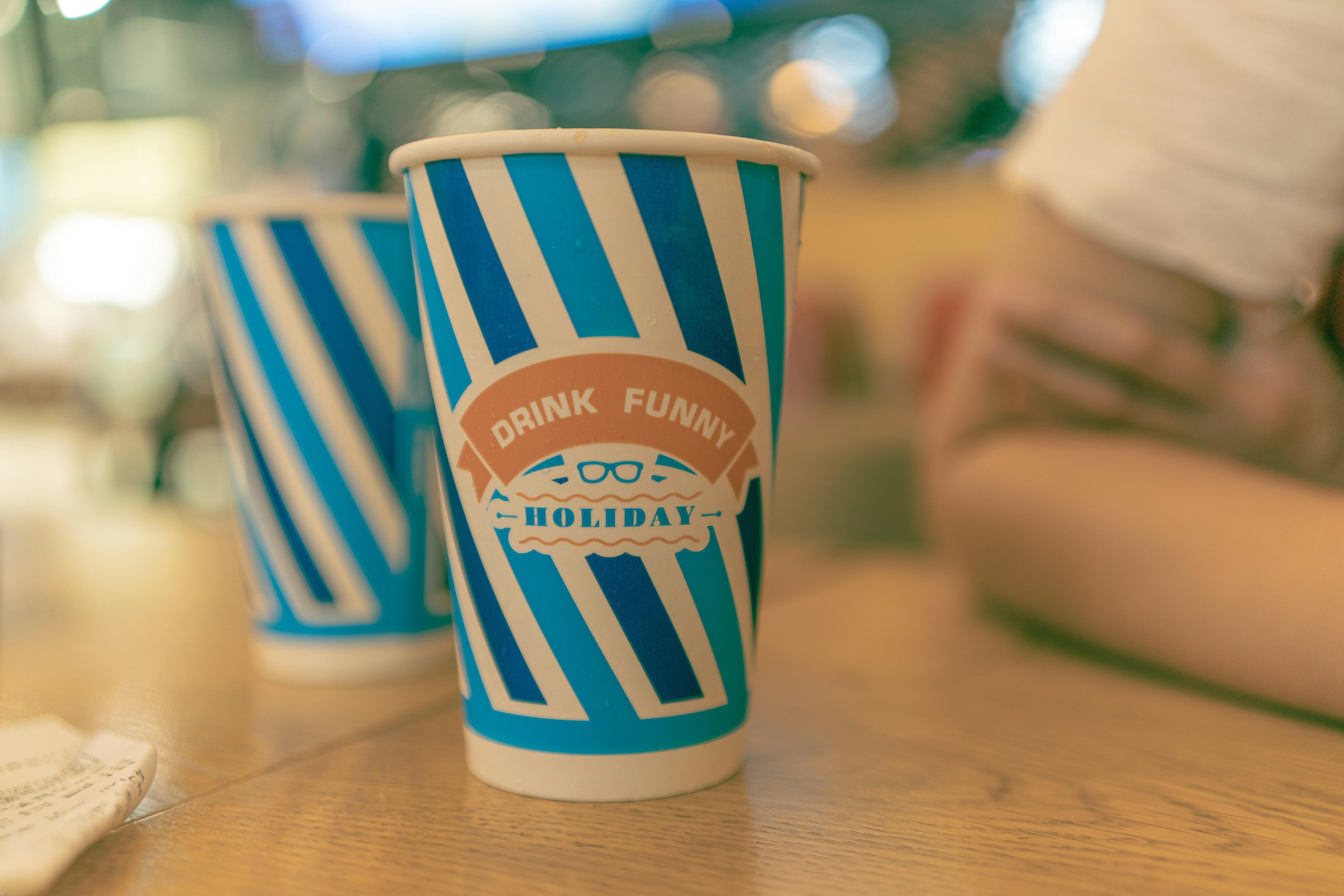 Blue Stripes at Center: A Quiet Café Moment