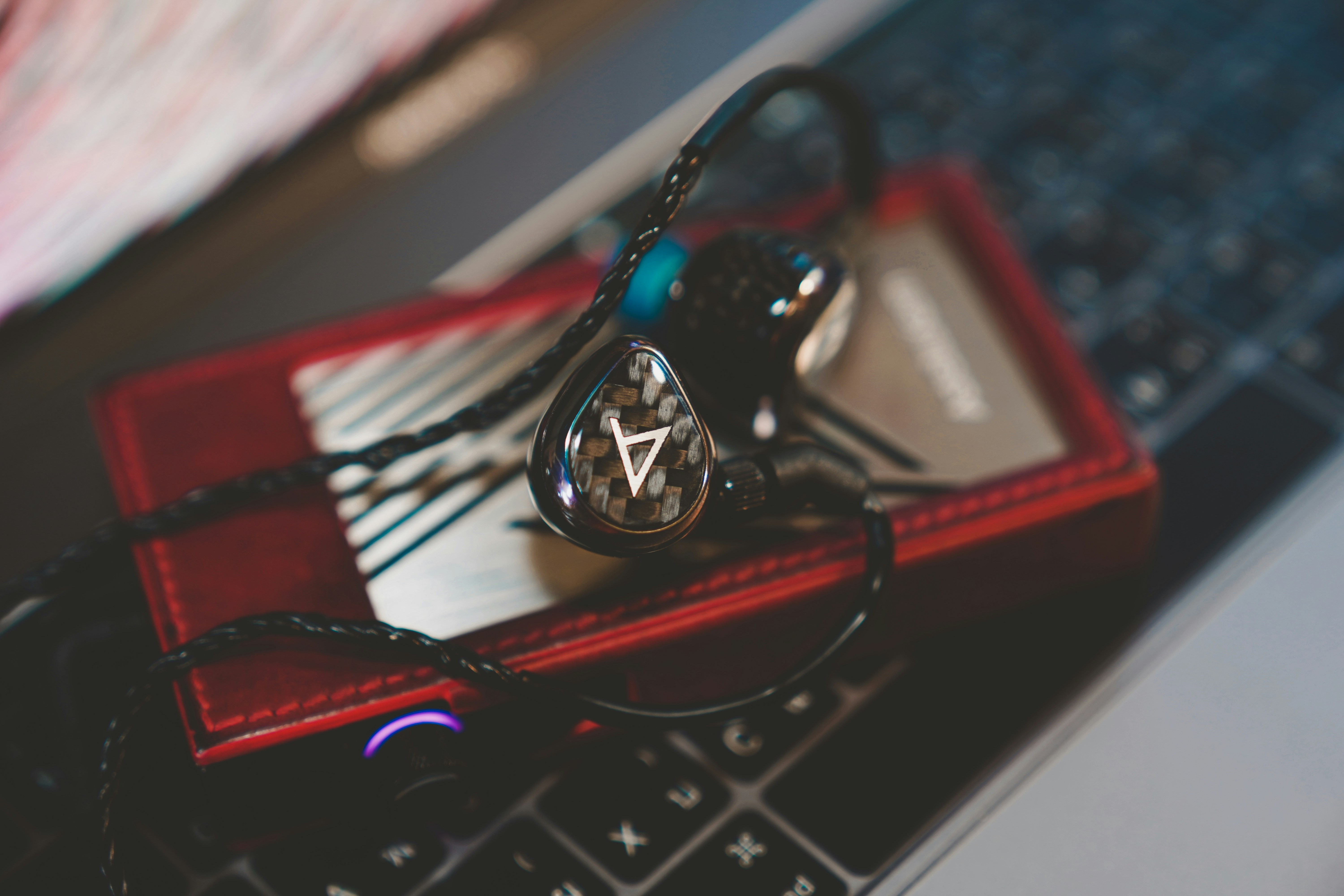 Black and silver car key on black and red computer keyboard photo ...