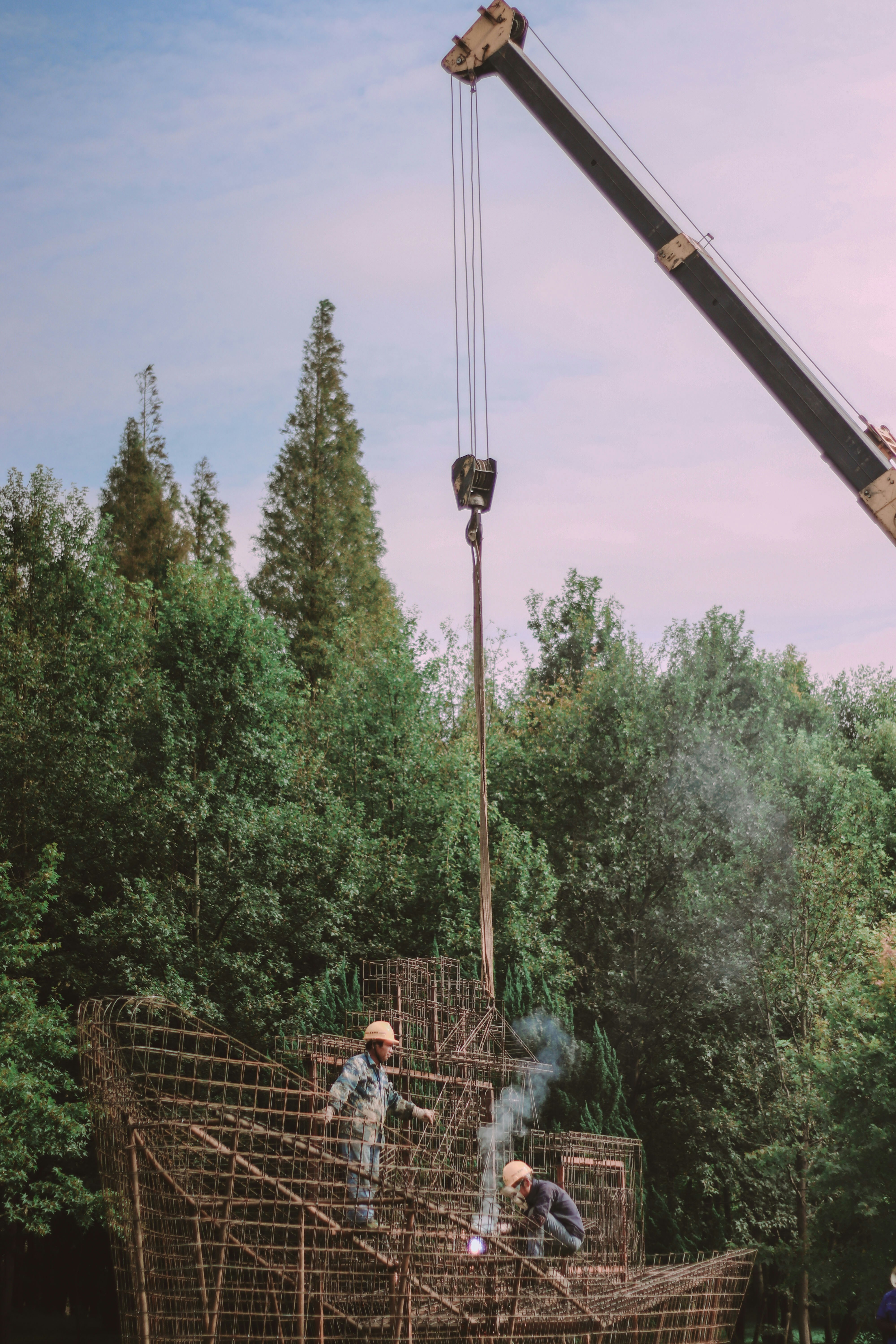 Crane Lift Over a Timber Construction