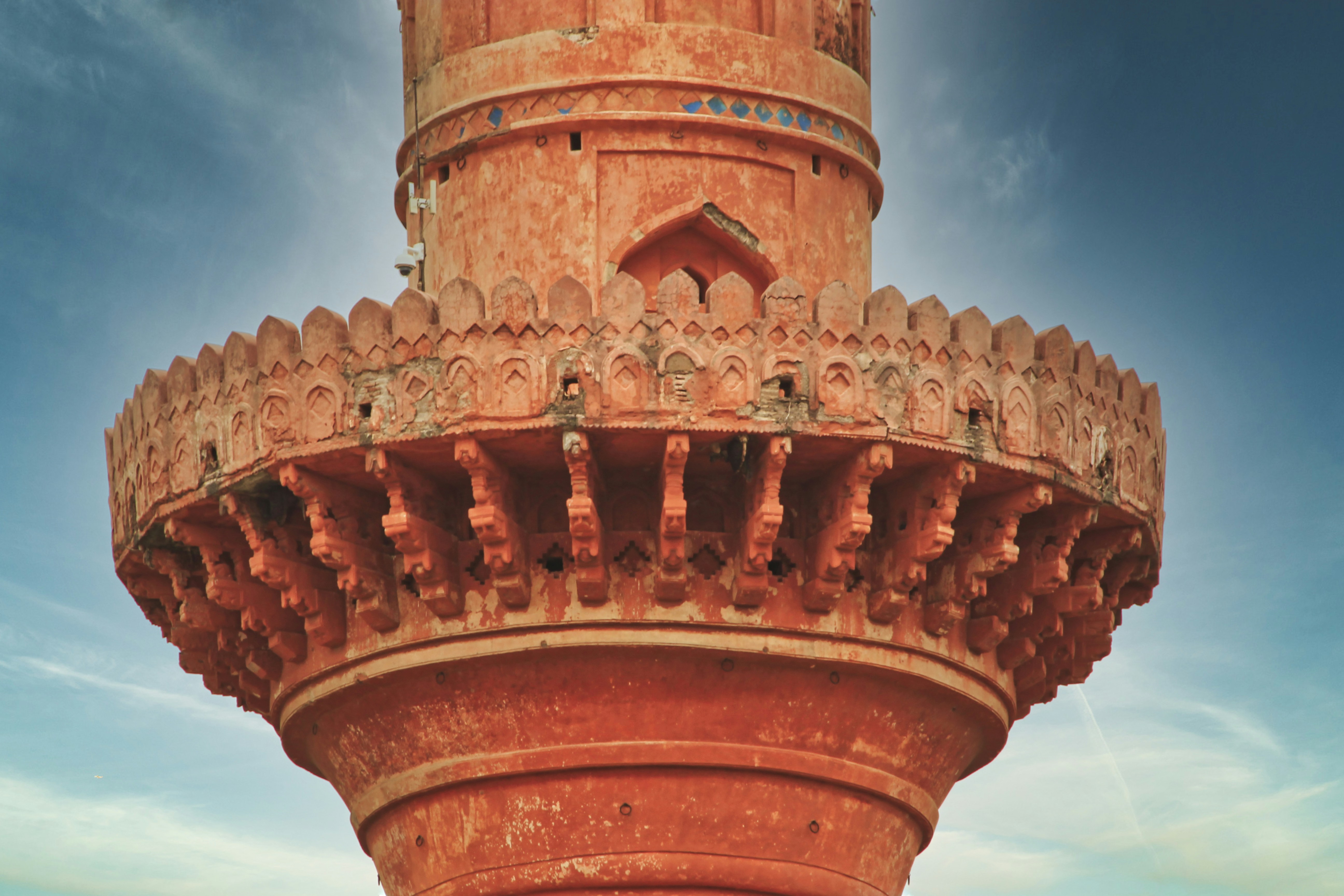 Brick Crown: Close-Up of a Red Turret's Crenellated Gallery