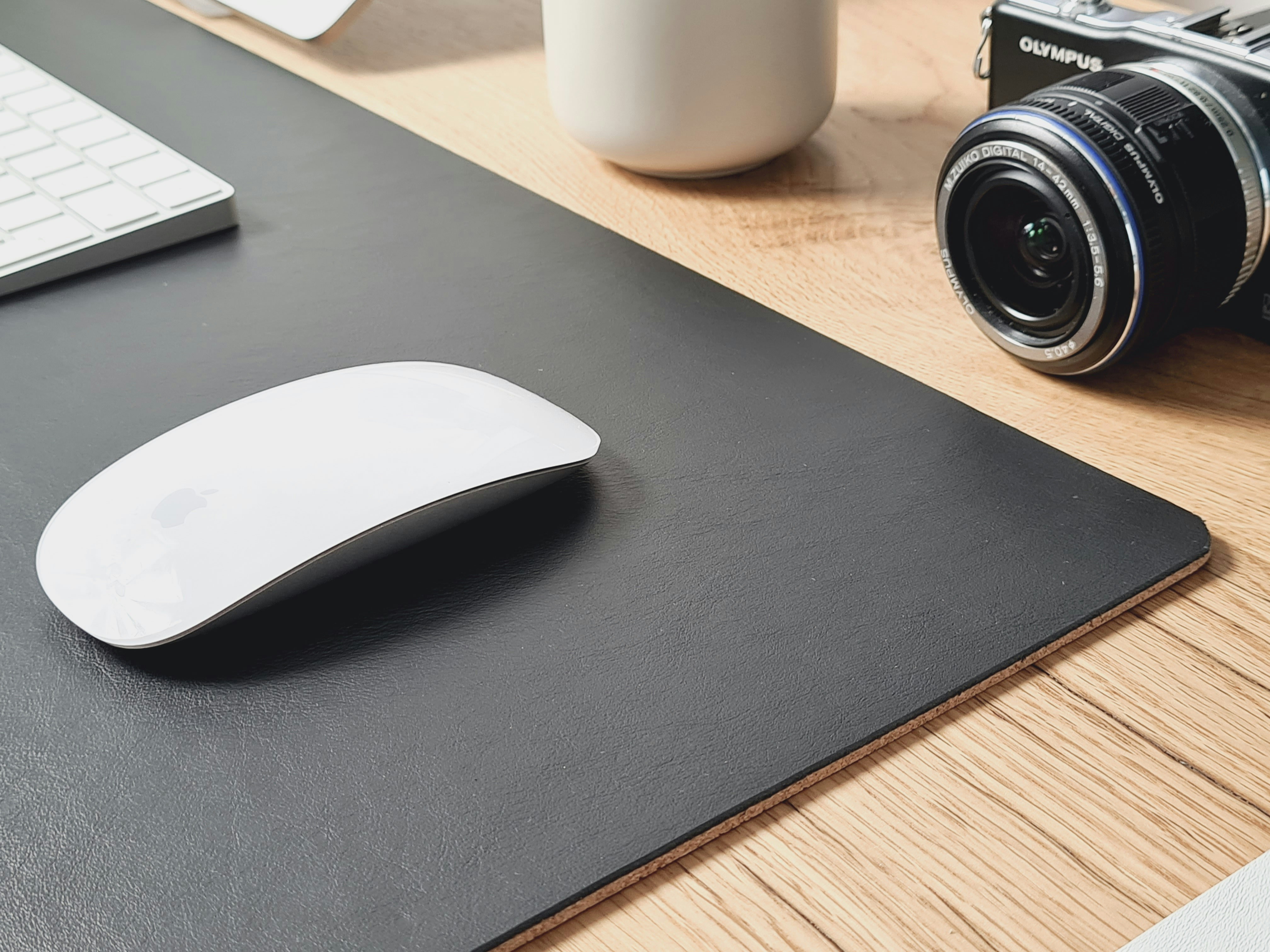 White and black computer mouse on black mouse pad photo – Free Grey ...